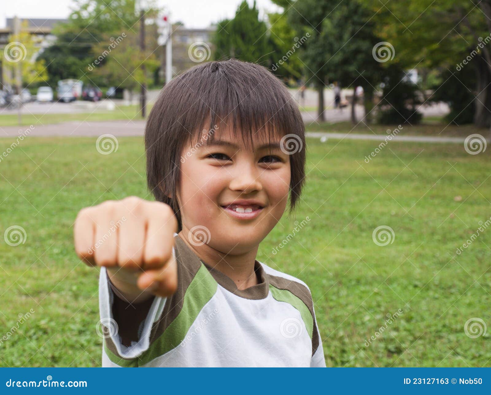 Boy punching with fist stock image. Image of standing - 23127163