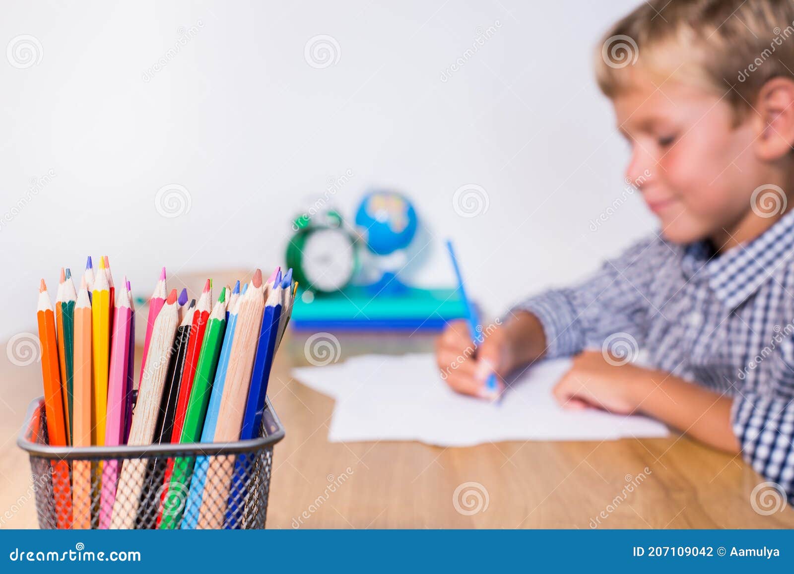 Boy, Pupil Sitting at the Table and Studying from Home Stock Photo ...