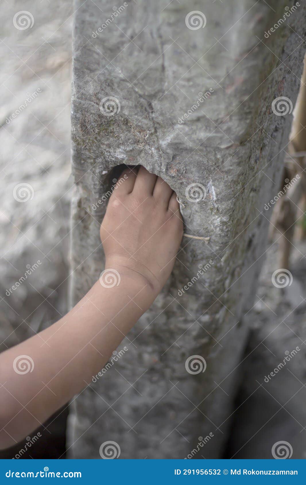 A Boy Puts His Hand Inside the Pole Hole Stock Photo - Image of blur ...