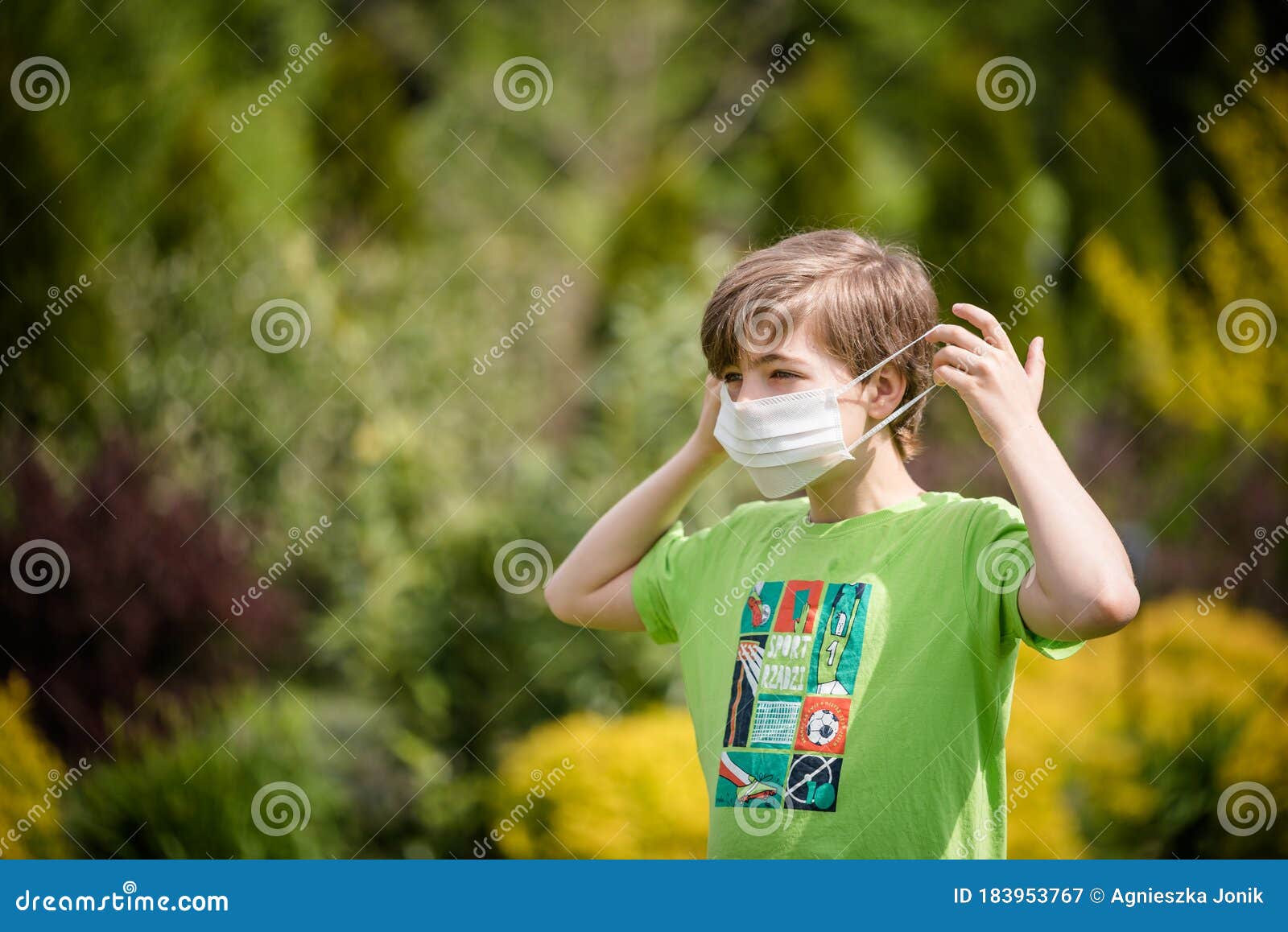 Boy Putting a Mask on Her Face Stock Image - Image of playing, hygiene ...