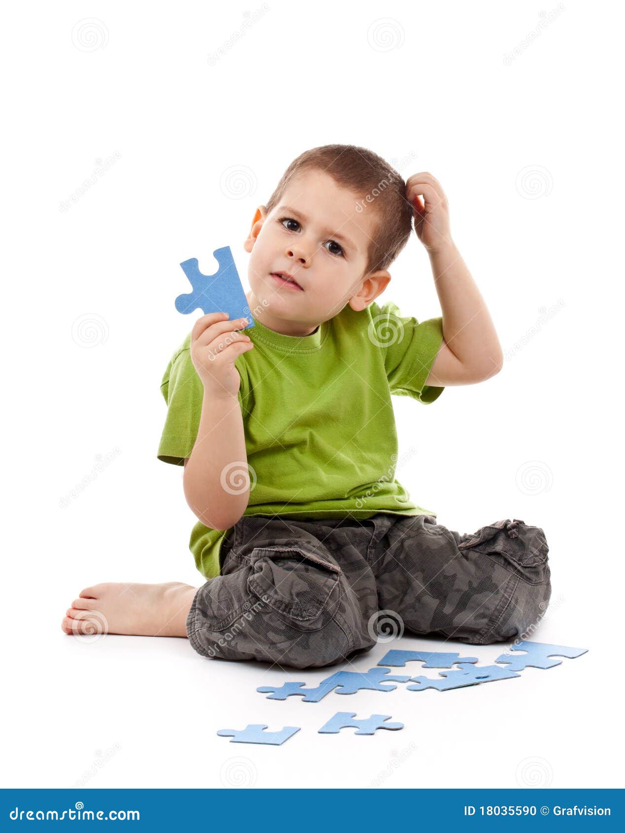 Boy with puzzles stock photo. Image of model, child, element - 18035590