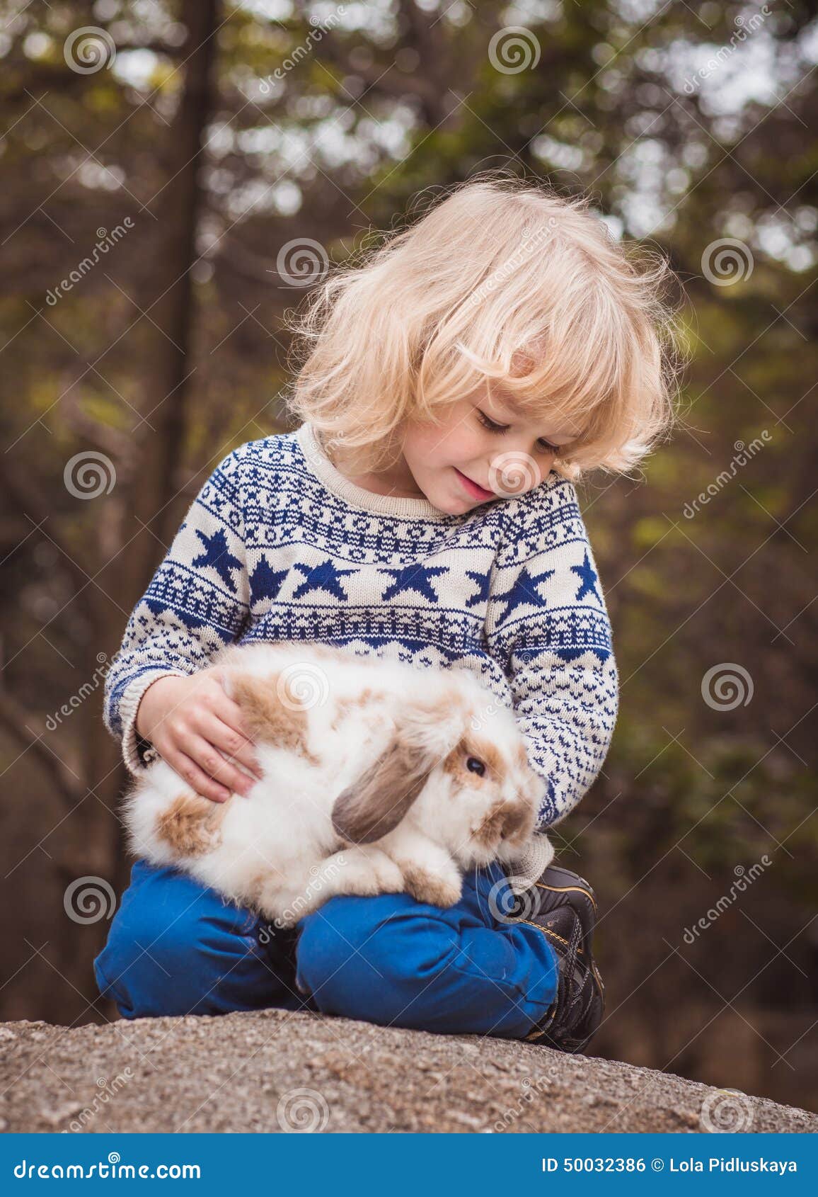 Boy and rabbit stock photo. Image of smile, friend, blond - 50032386