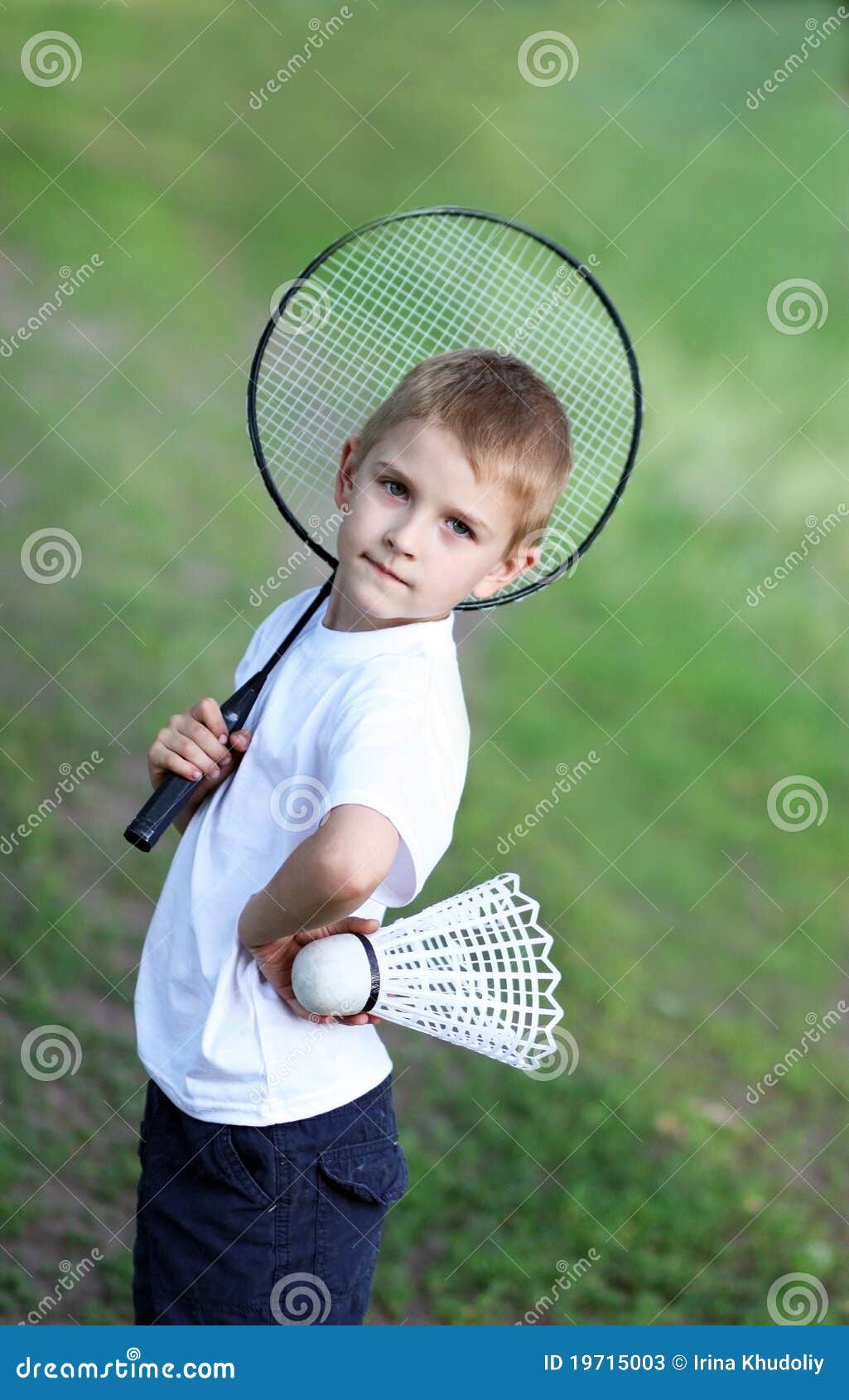 The boy with a racket stock image. Image of white, grass - 19715003