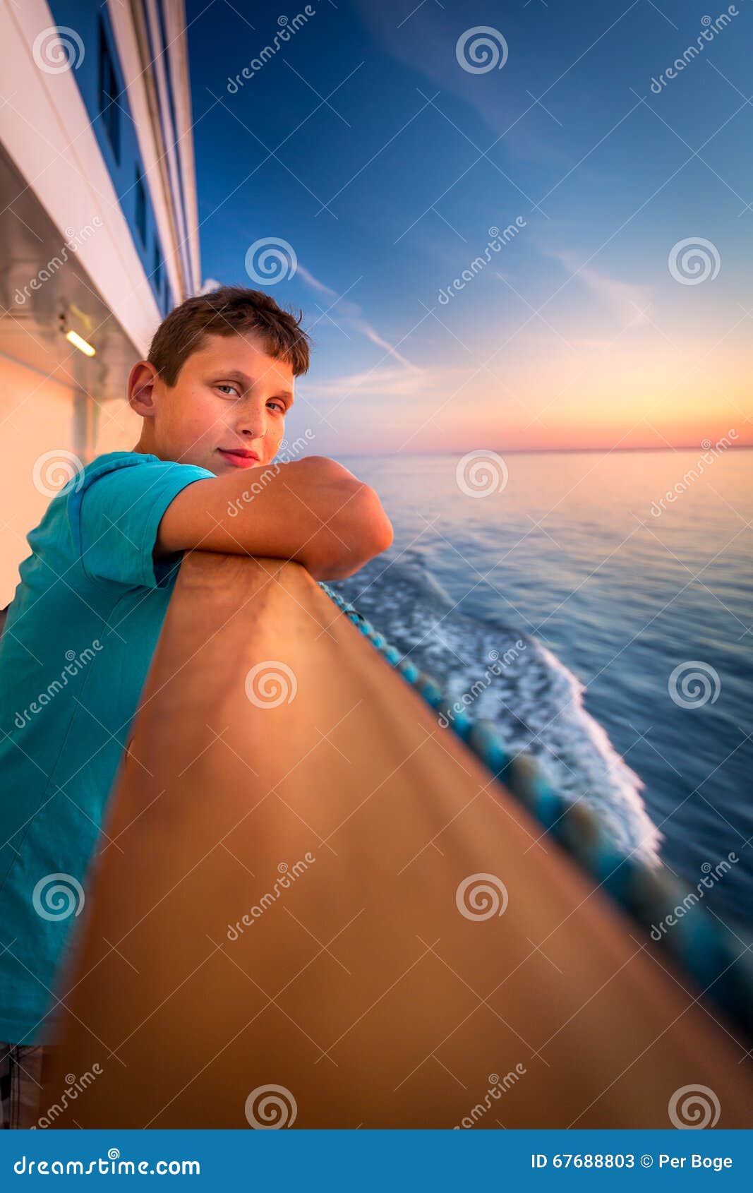 Boy at the Railing of a Cruise Ship at Sunset. Stock Image - Image of ...