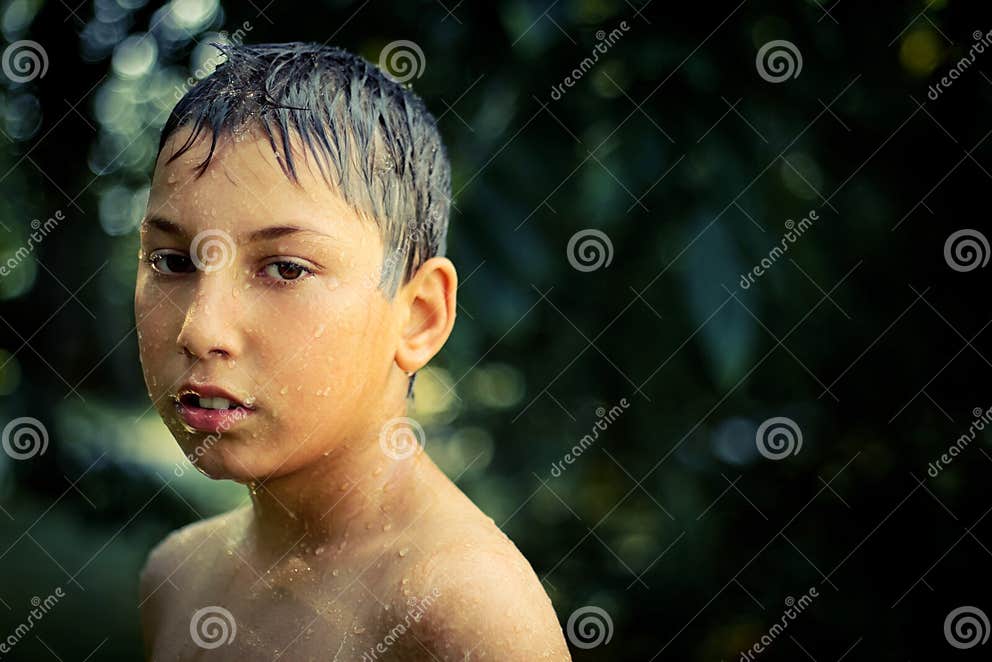Boy after rain stock image. Image of splash, white, beauty - 67101147