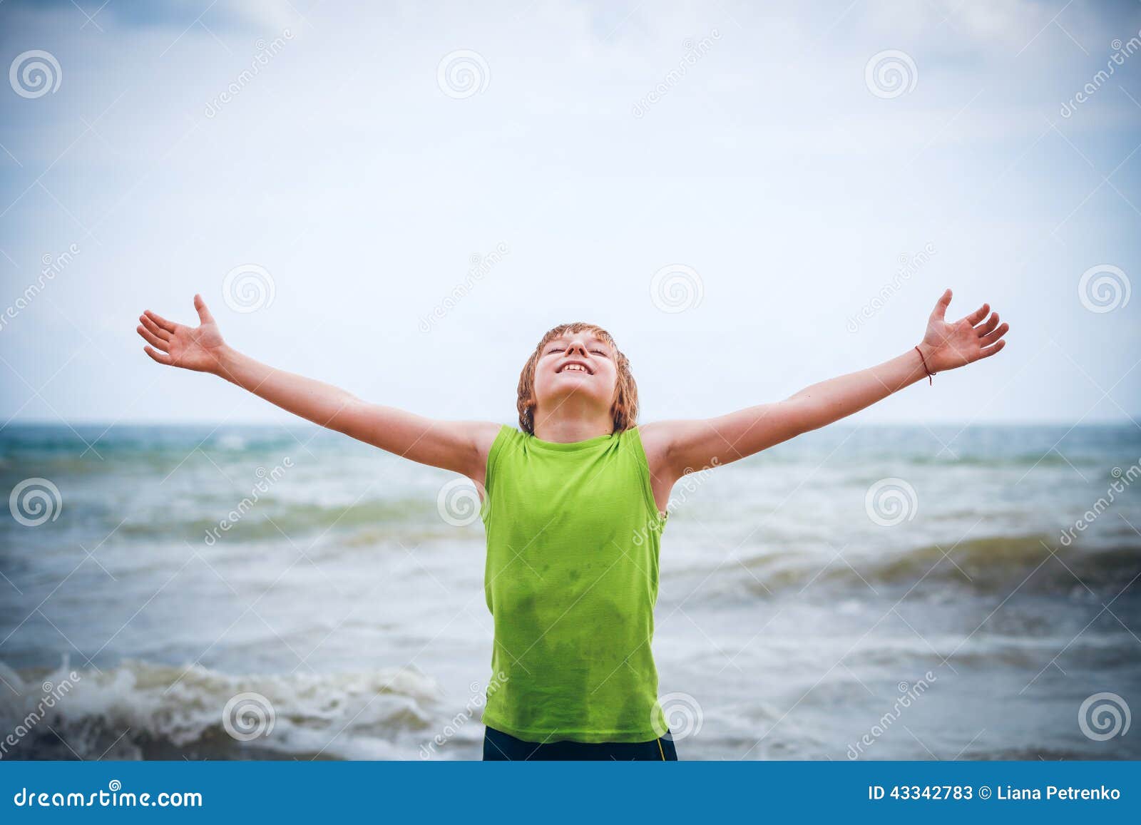 Boy with Raised Hands on the Seashore Stock Image - Image of water ...