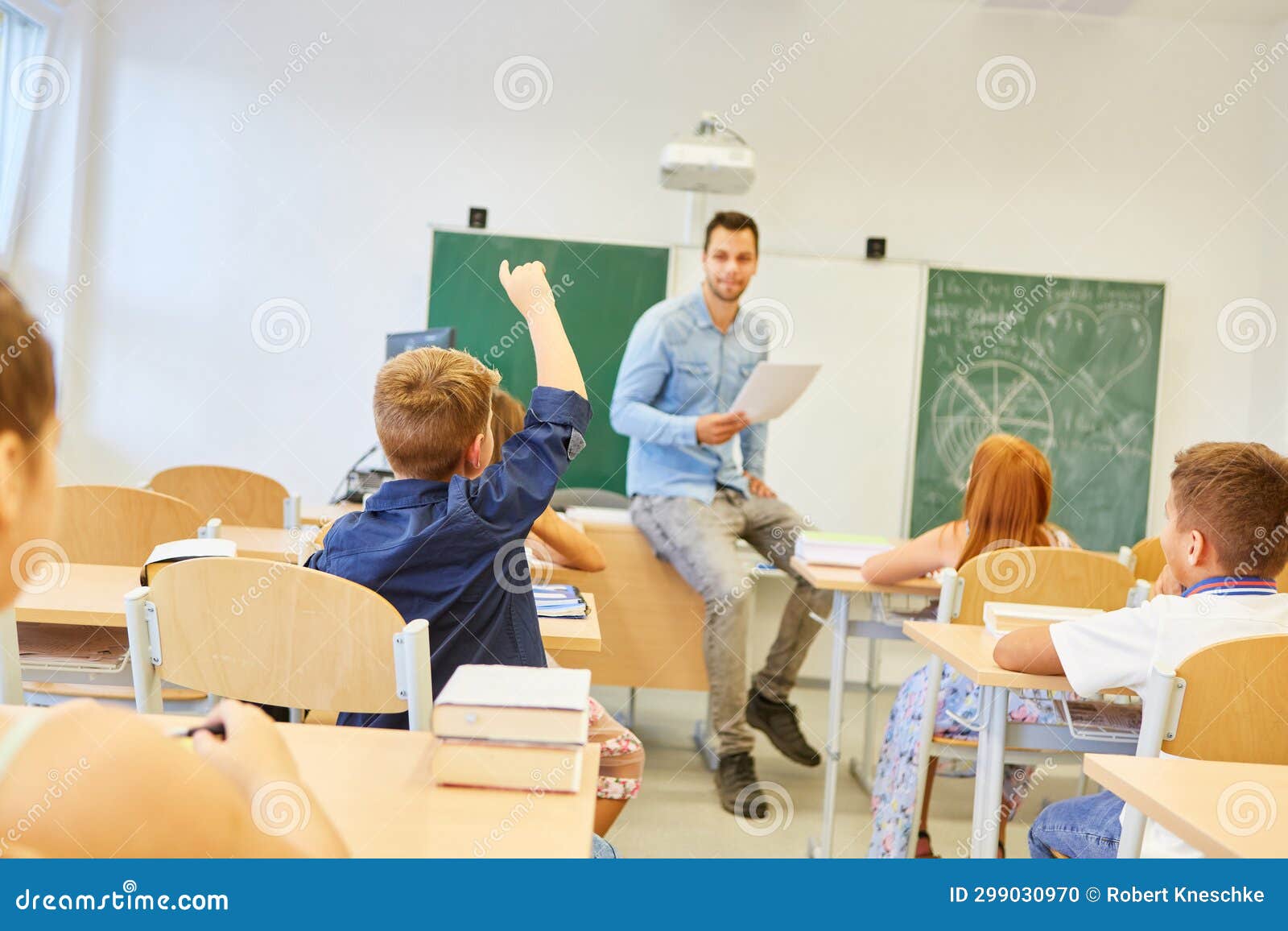 Boy Raising Hand during Lecture in Classroom Stock Photo - Image of ...
