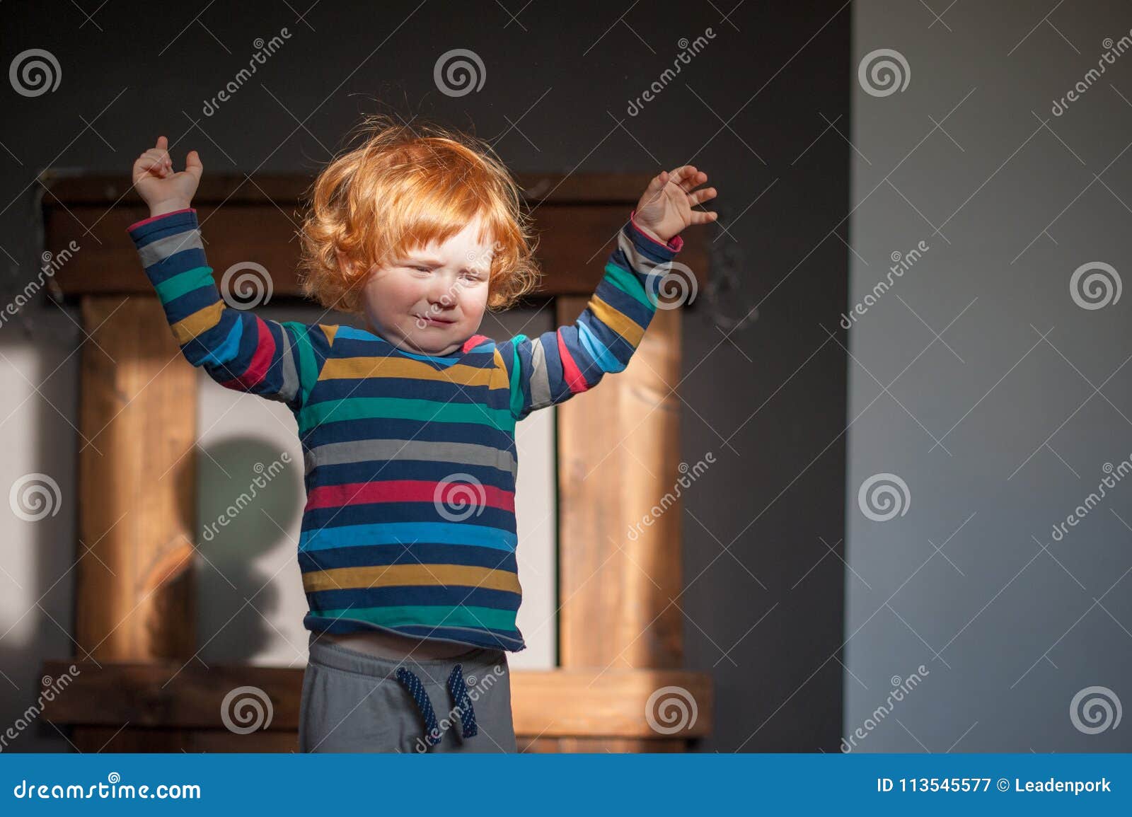 The Boy in the Rays of Bright Light Stock Image - Image of outraged ...