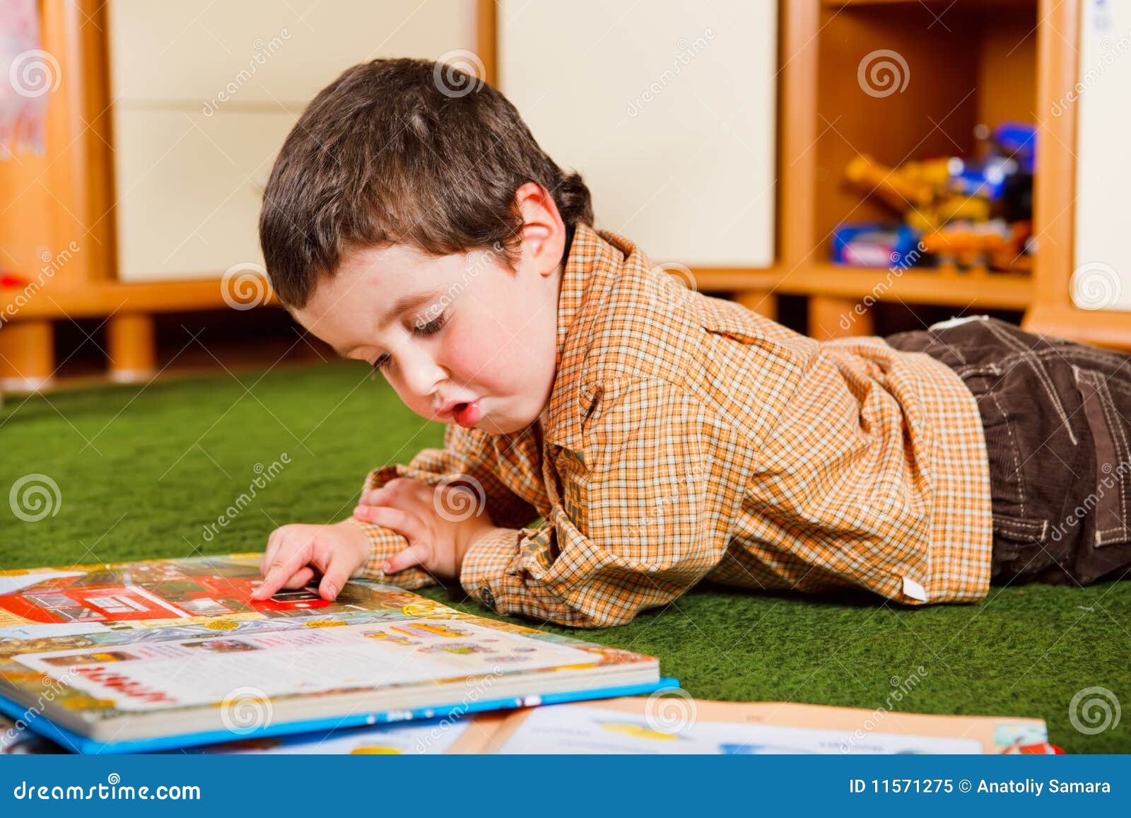 Boy reading stock image. Image of child, elementary, education - 11571275