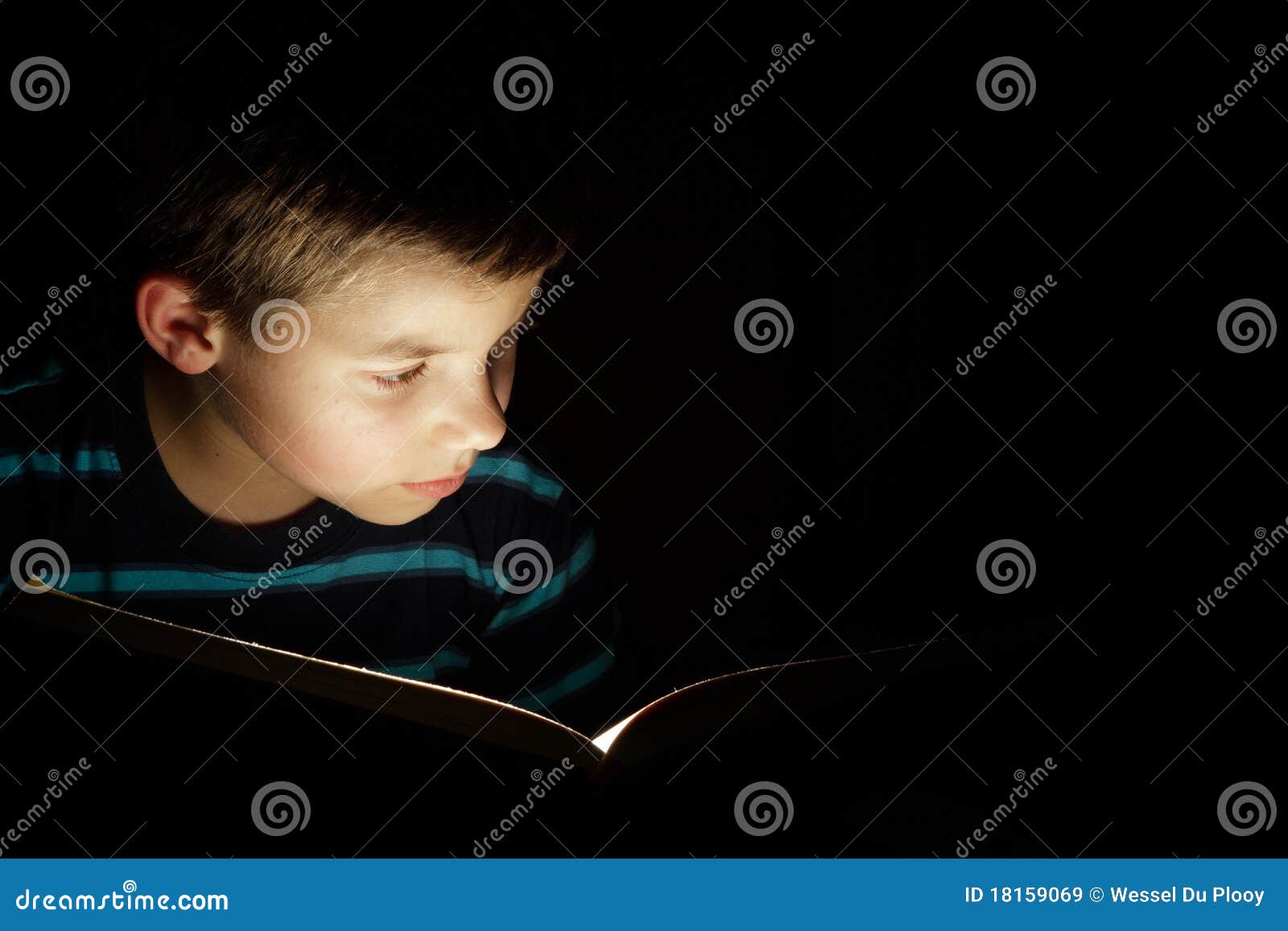 Boy reading bedtime story stock image. Image of little - 18159069