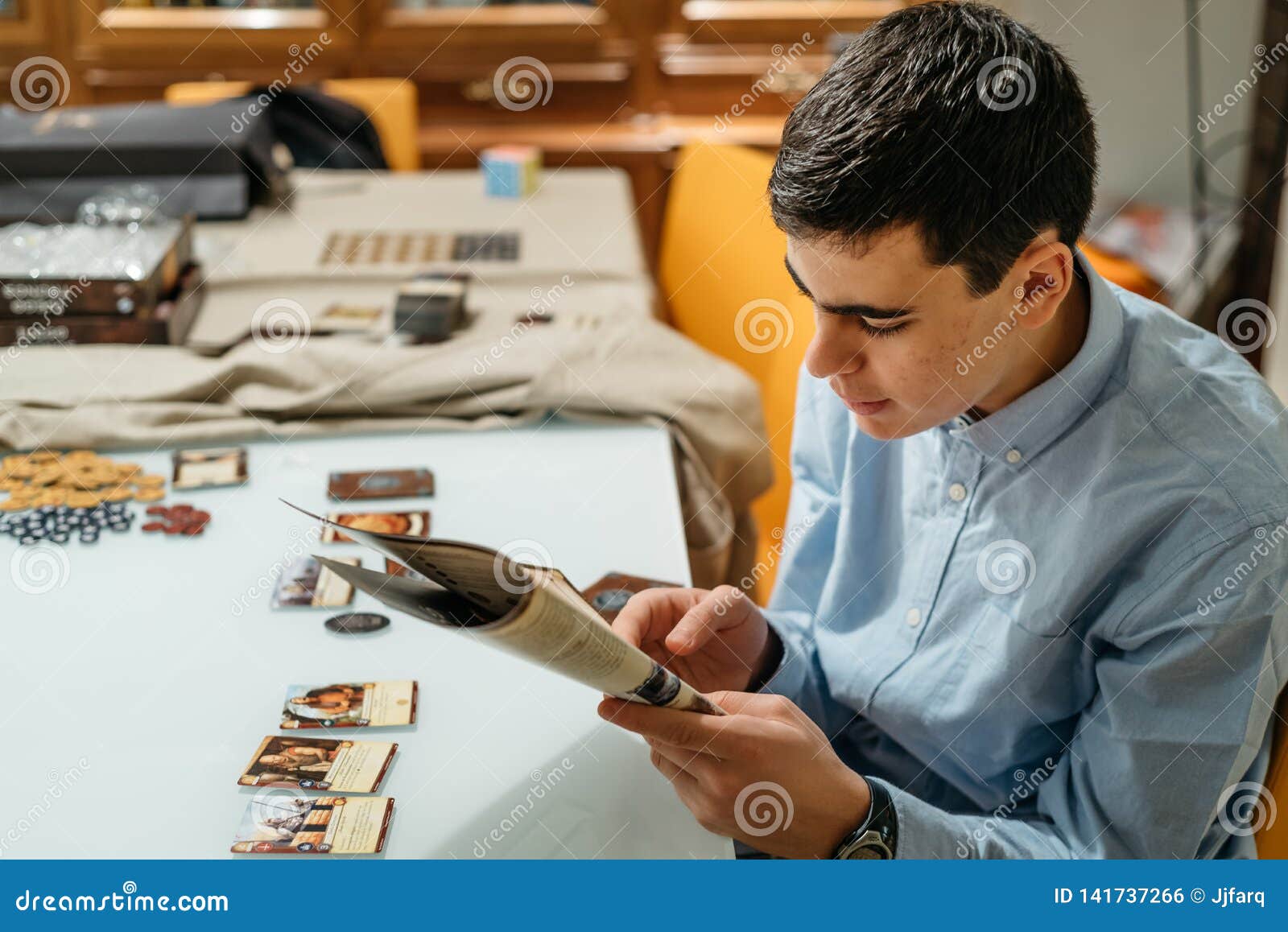 Boy Reading Boardgame Rules Playing Stock Photo - Image of game, play ...