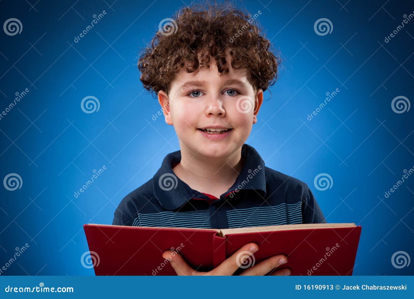 Boy reading book stock image. Image of adolescent, blue - 16190913