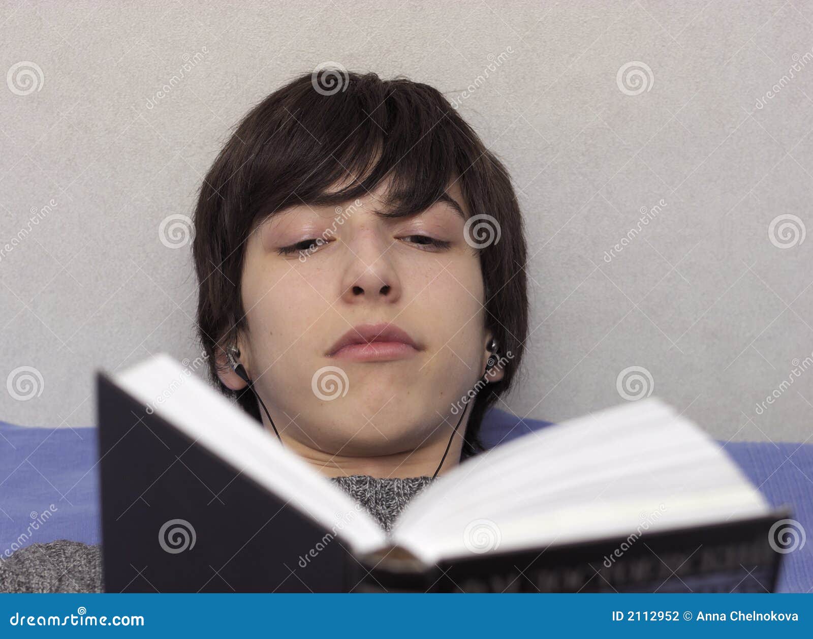 Boy reading book. stock photo. Image of casual, recreation - 2112952