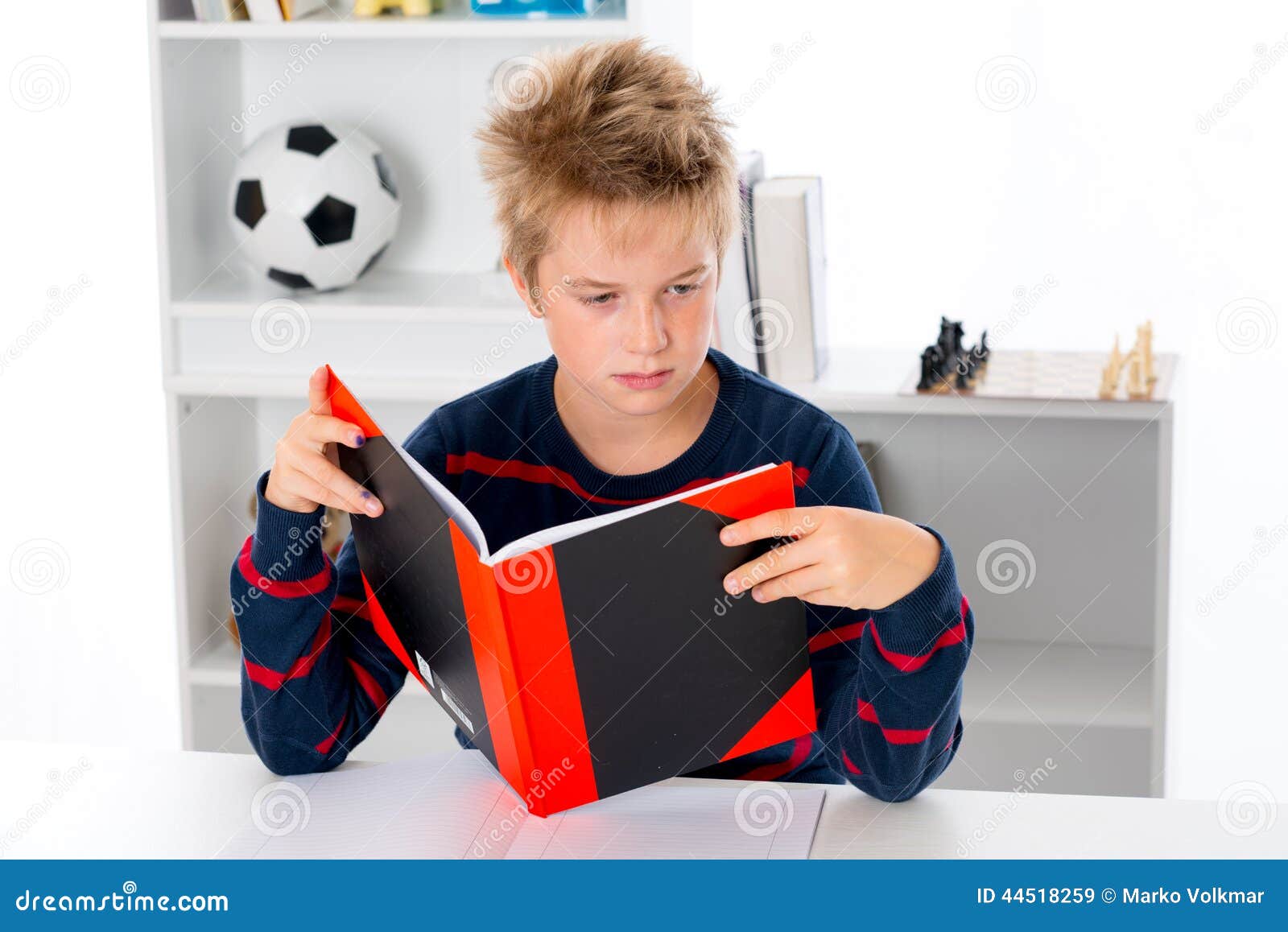 Boy is reading stock image. Image of reflecting, blond - 44518259