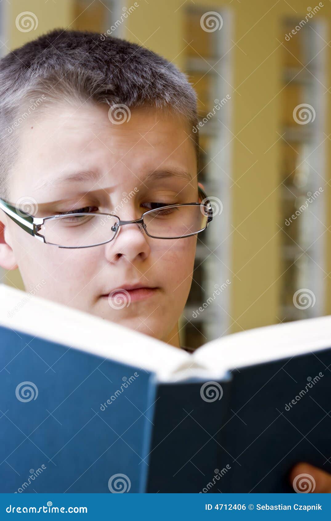 Boy reading book stock photo. Image of learn, doubt, intelligent - 4712406