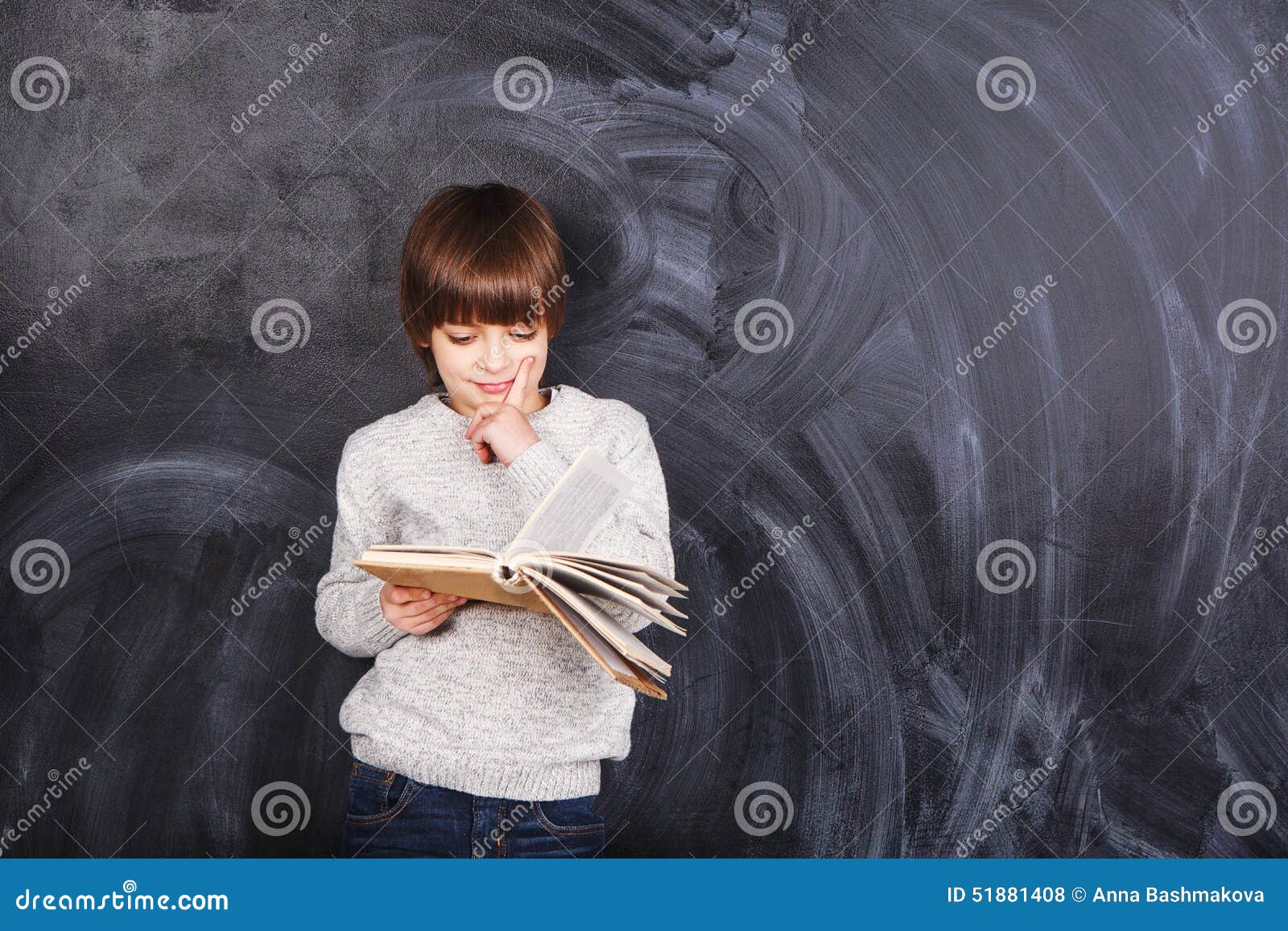 Boy reading a book stock photo. Image of happy, reading - 51881408