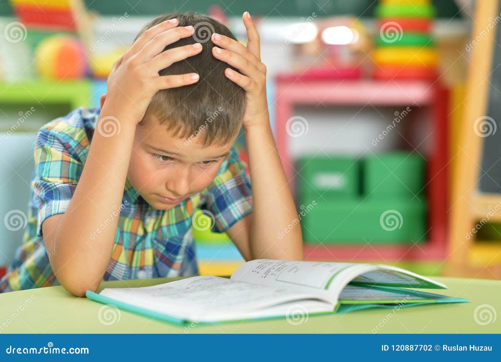 Boy reading book stock photo. Image of think, classroom - 120887702