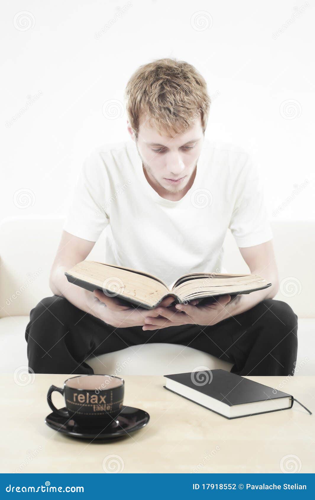 Boy Reading a Book and Relaxing Stock Photo - Image of casual, male ...