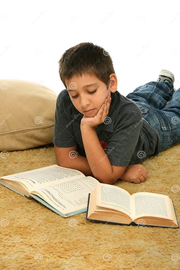 Boy Reading Books on the Floor Stock Photo - Image of reading, homework ...