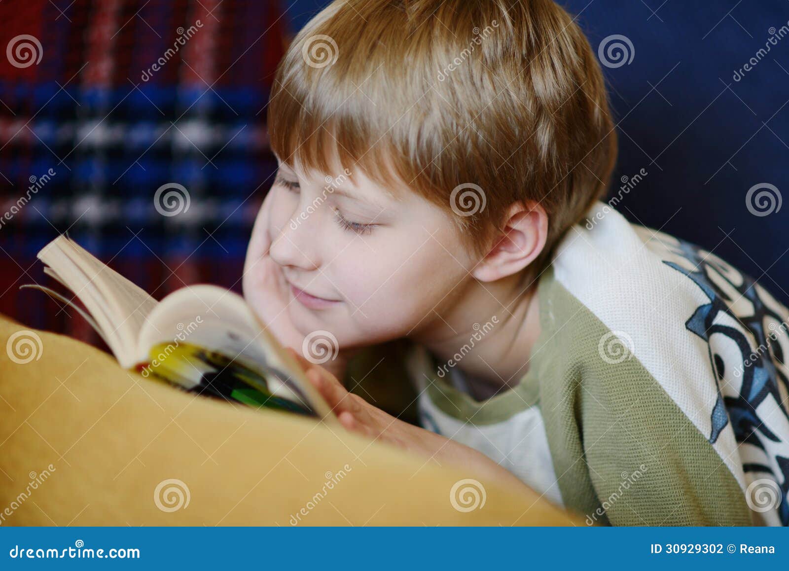 Boy reading at home stock photo. Image of pensive, reading - 30929302