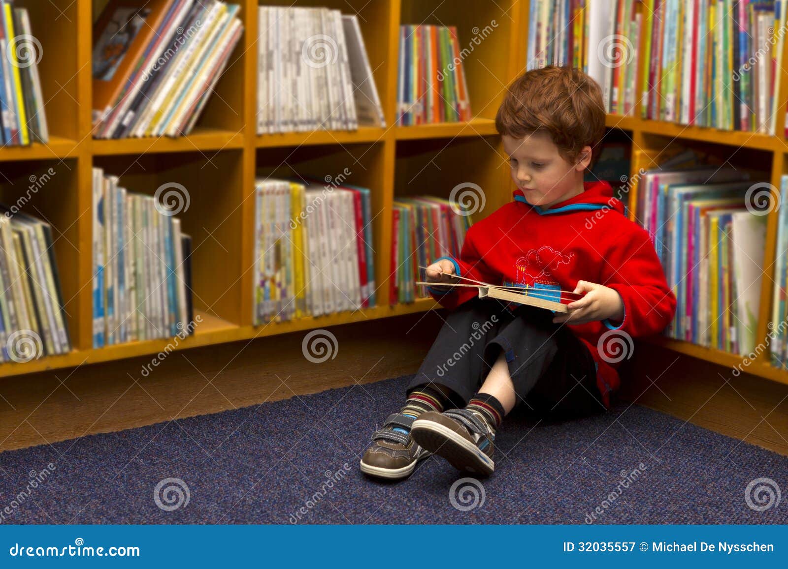 Boy Reading Learning in a Library Stock Image - Image of reads, book ...