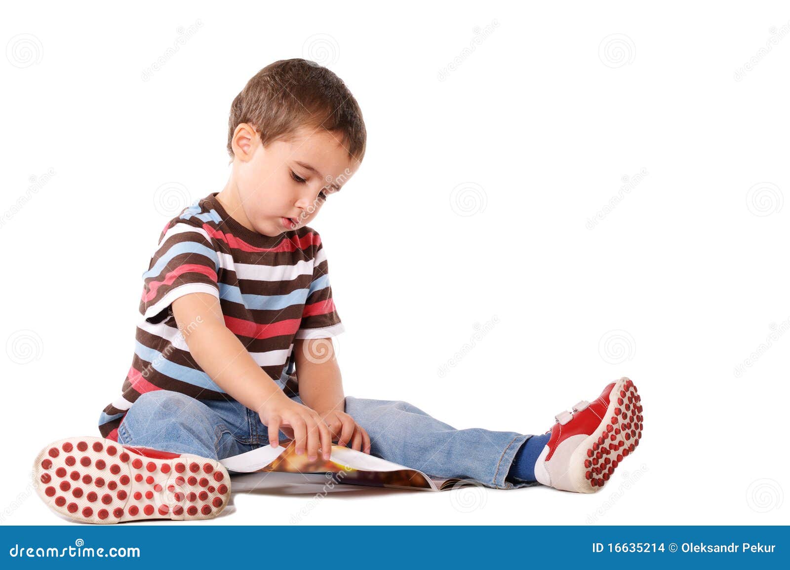 Boy reading magazine stock photo. Image of book, full - 16635214