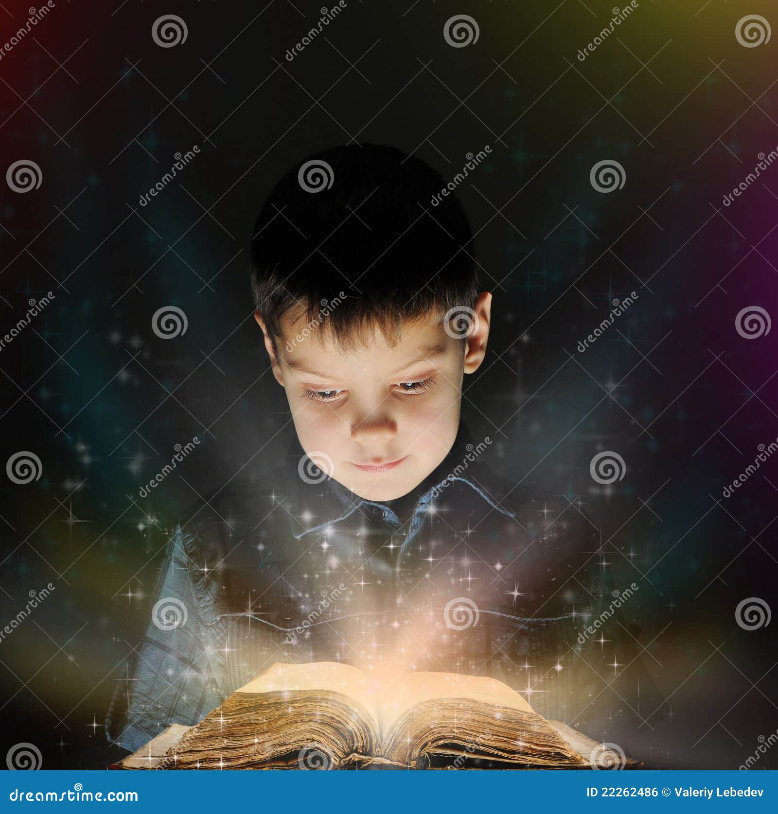 Boy is Reading a Magic Book Stock Photo - Image of library, magical ...