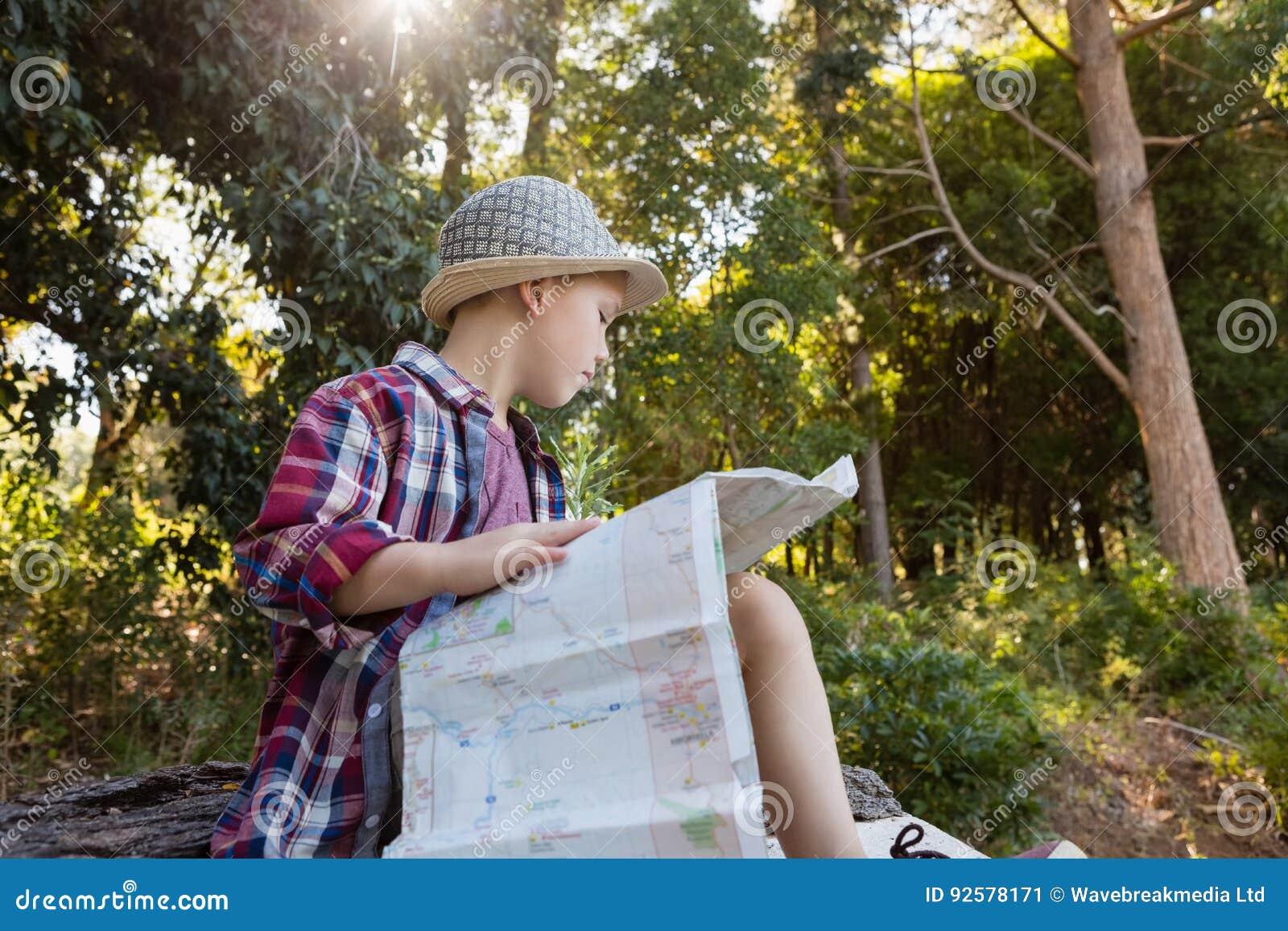 Boy Reading the Map in the Forest Stock Image - Image of searching ...