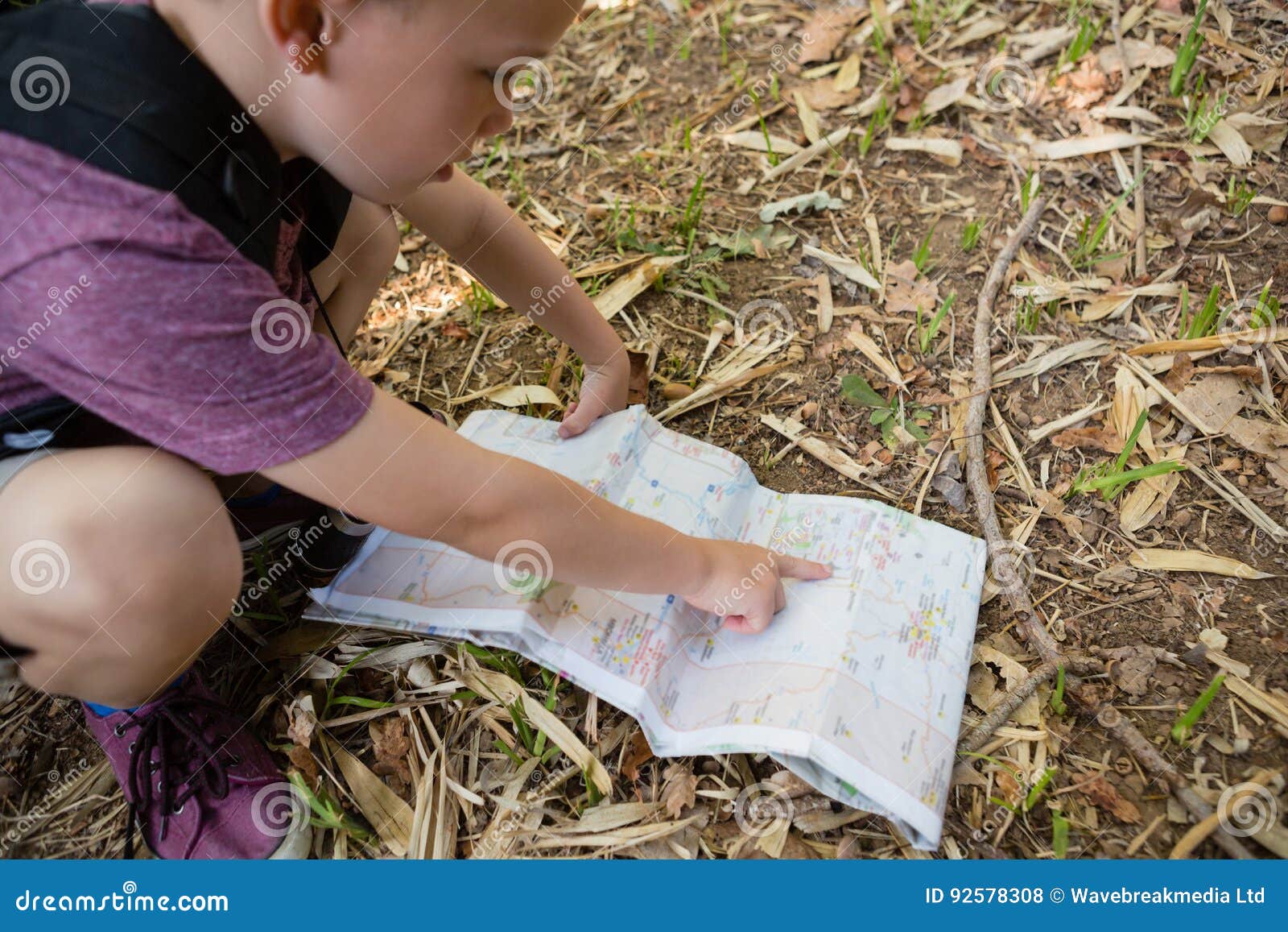 Boy Reading the Map in the Forest Stock Photo - Image of direction ...