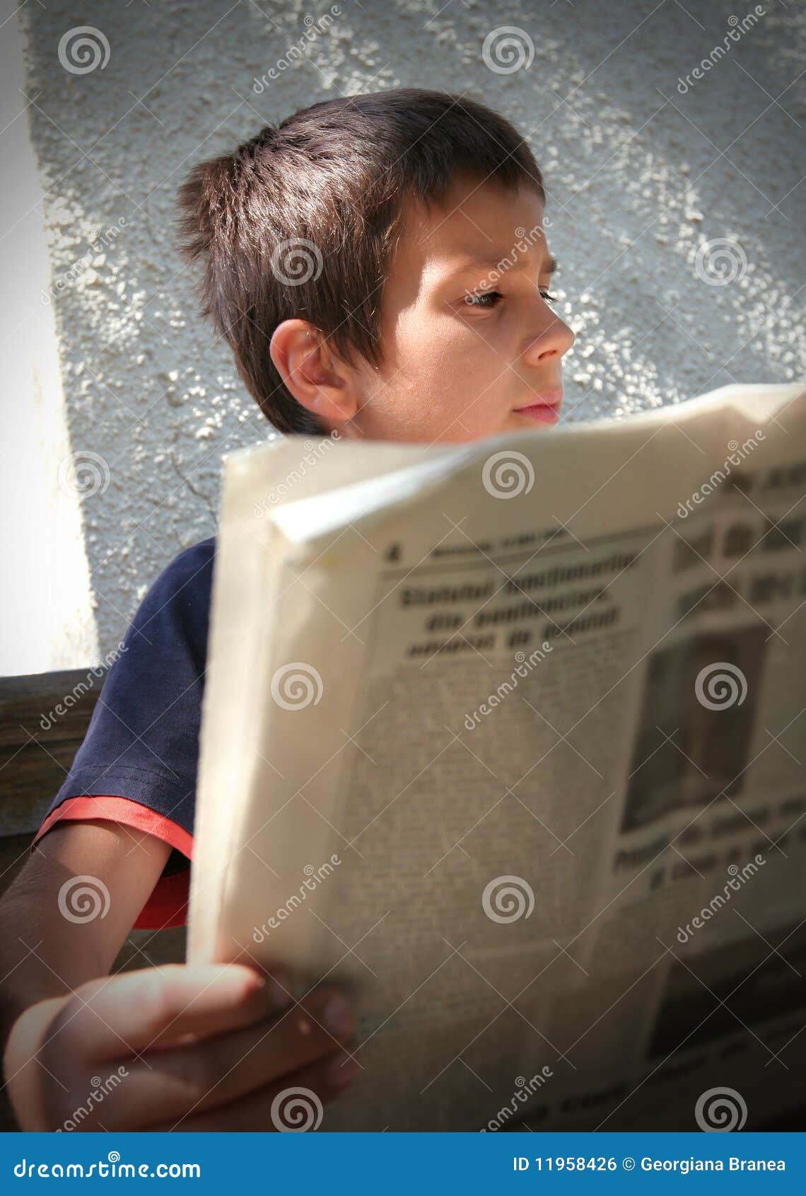 Boy Reading the News stock photo. Image of caucasian - 11958426