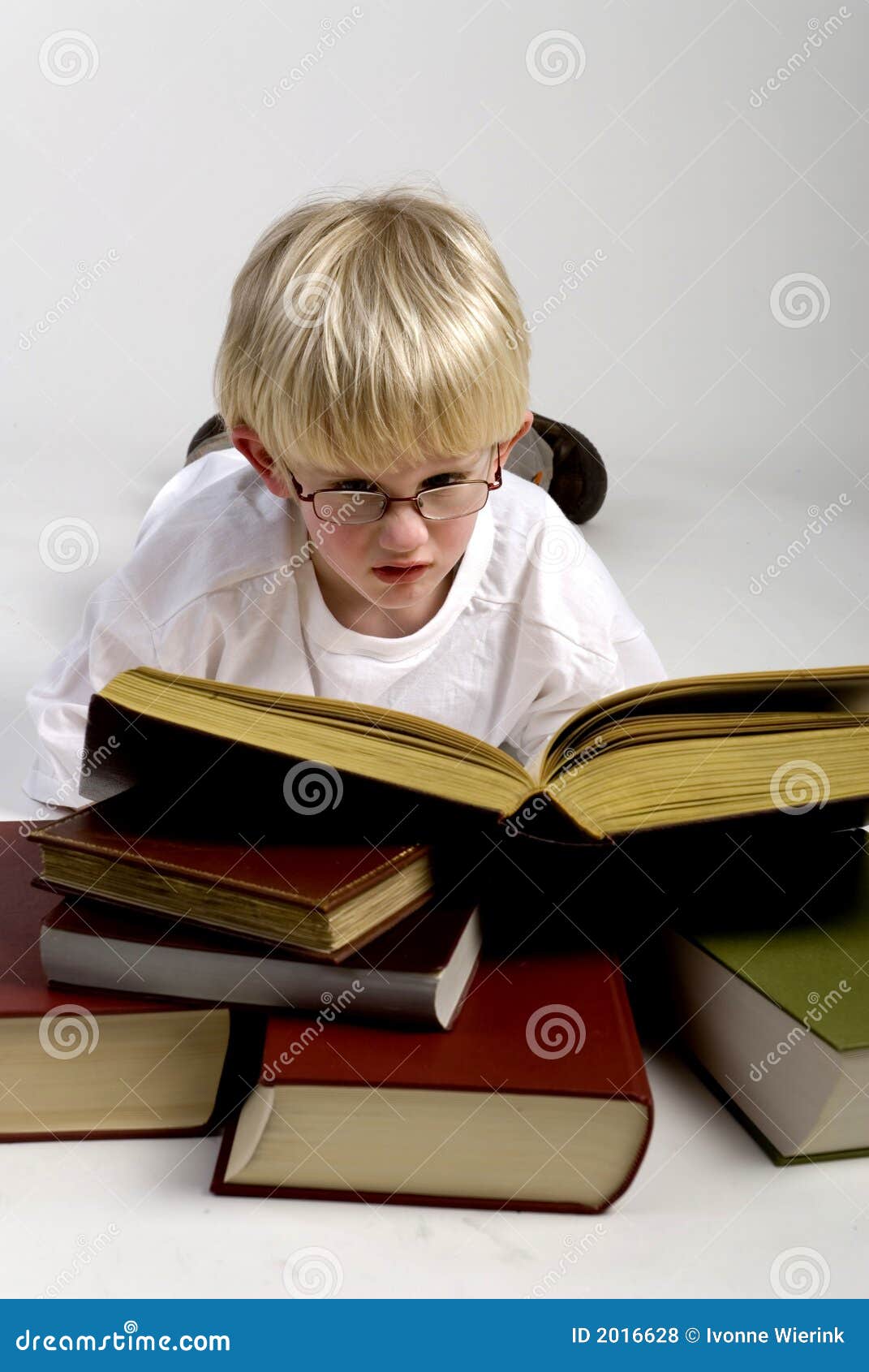 Boy is reading thick books stock photo. Image of read - 2016628
