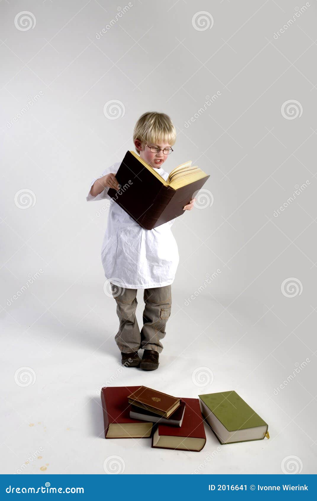 Boy is reading thick books stock image. Image of todd - 2016641