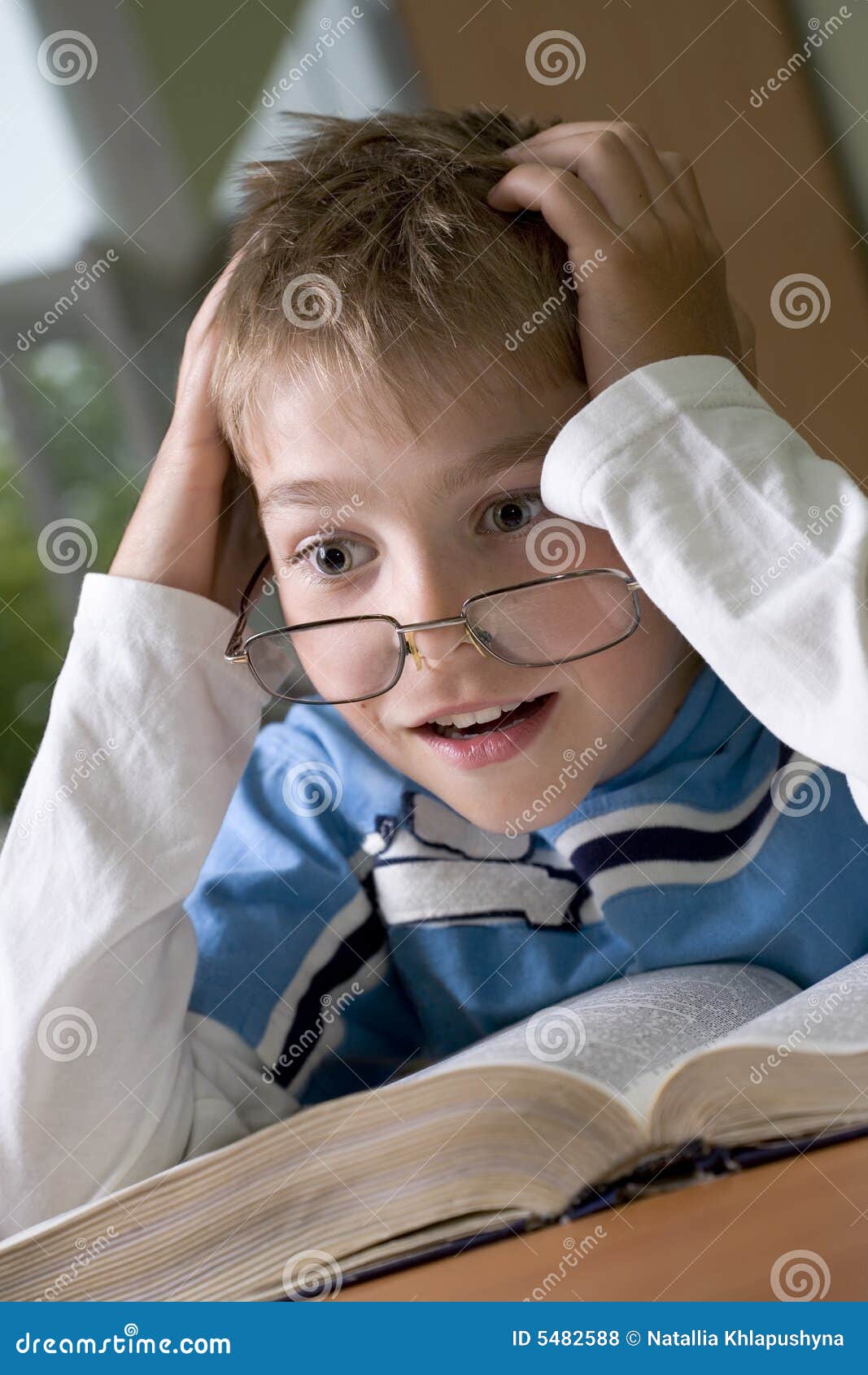 The boy reads the book stock photo. Image of child, book - 5482588