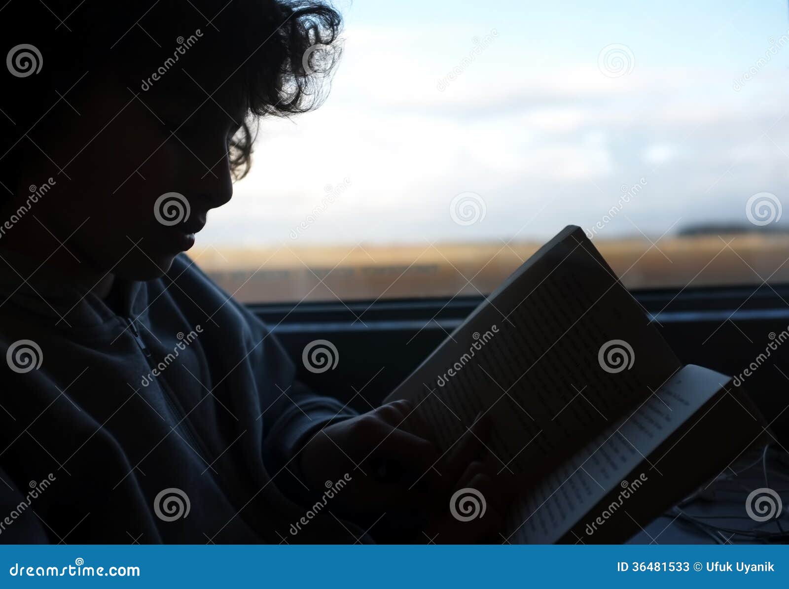 Boy Reads a Book on Train Journey Stock Image - Image of schoolchild ...