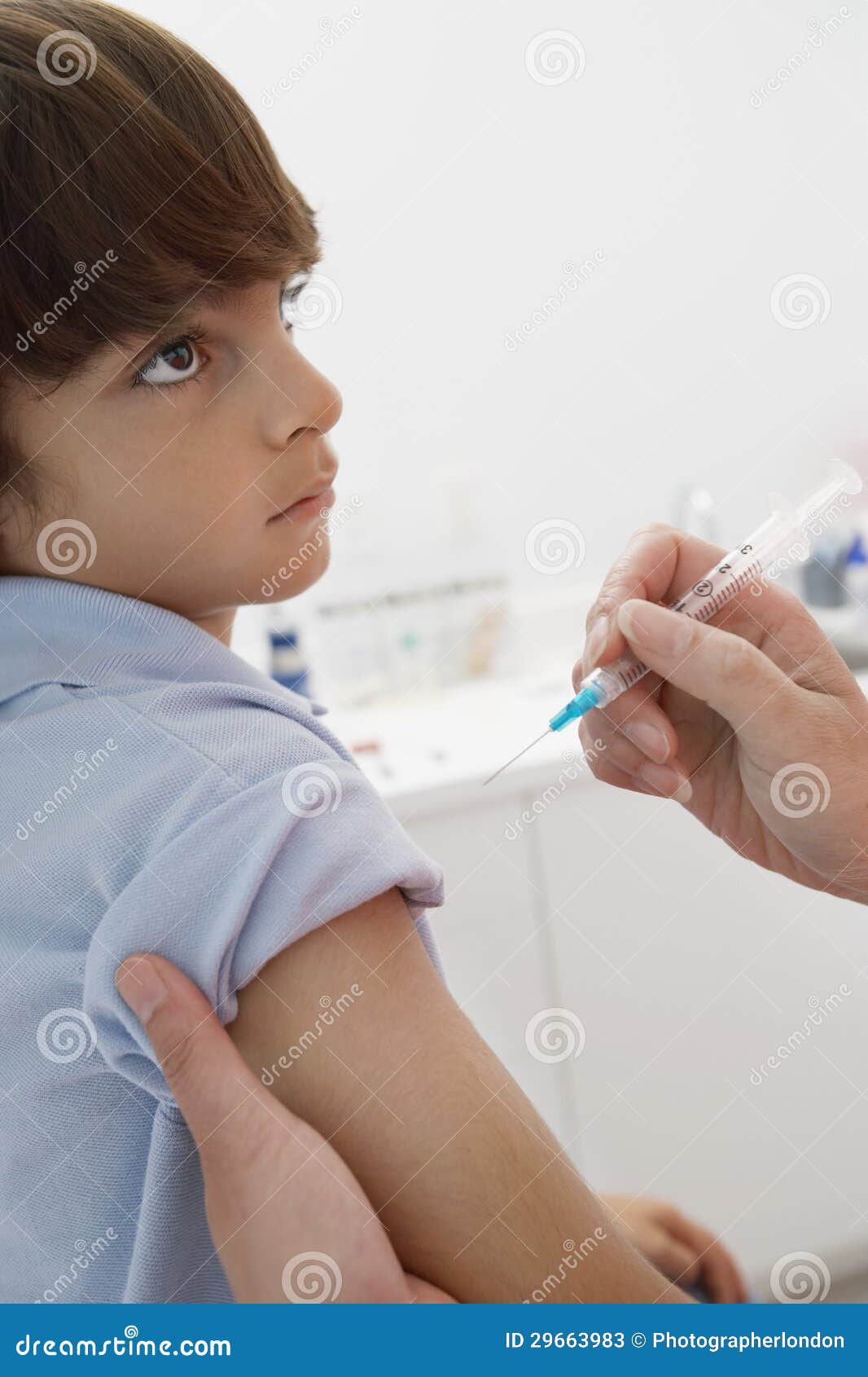 Boy Receiving Injection stock image. Image of medical - 29663983