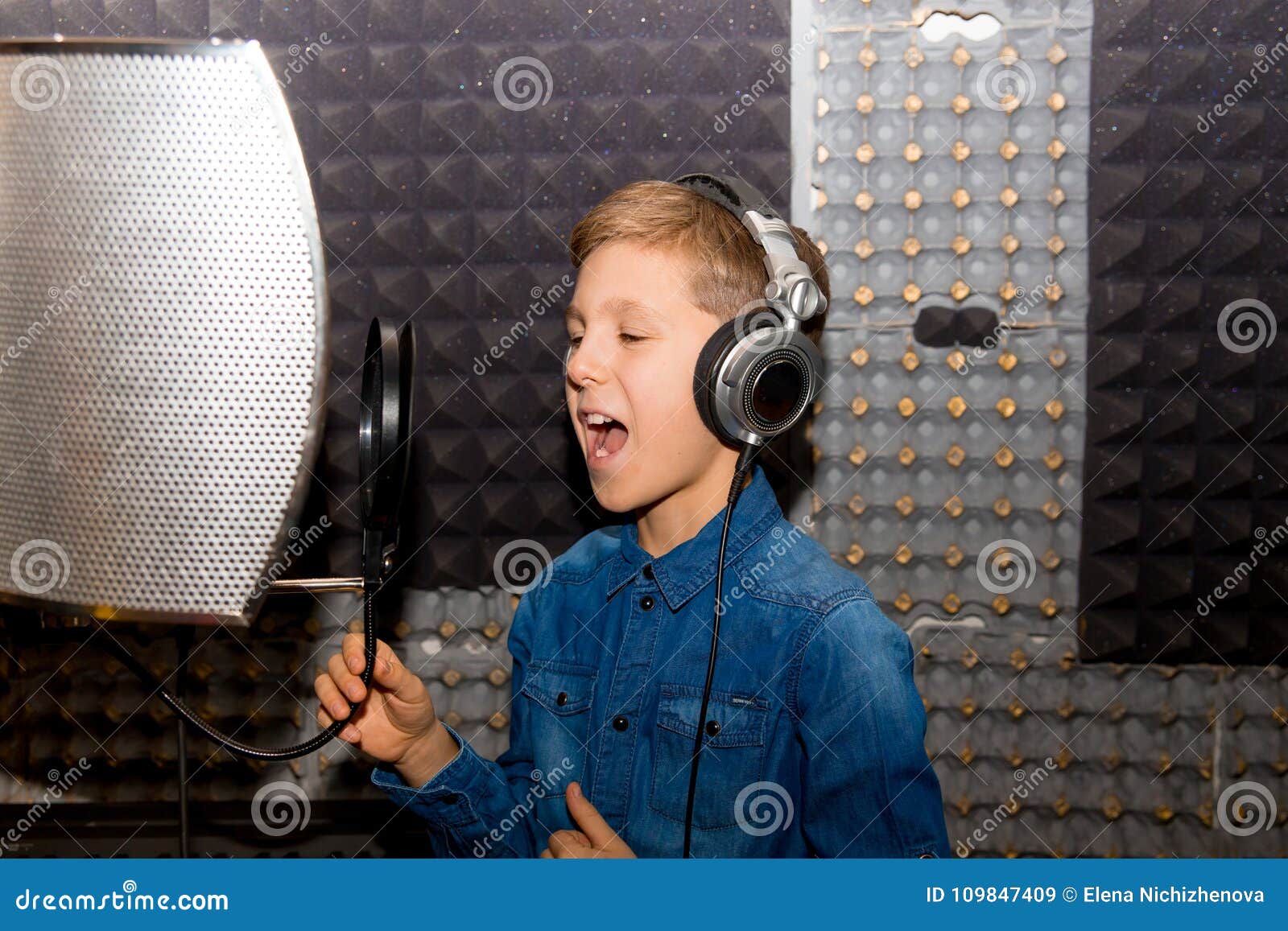 Boy in a recording studio stock image. Image of line - 109847409
