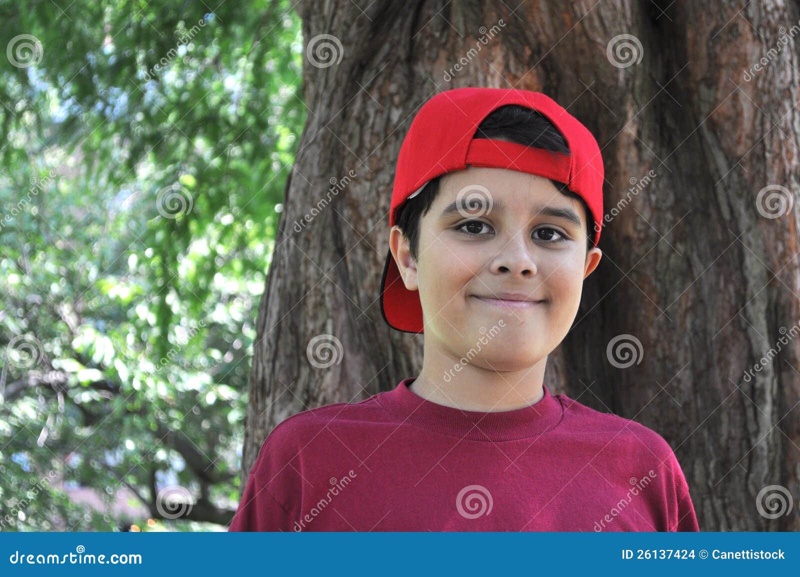 Boy in Red stock photo. Image of casual, tree, outdoor - 26137424