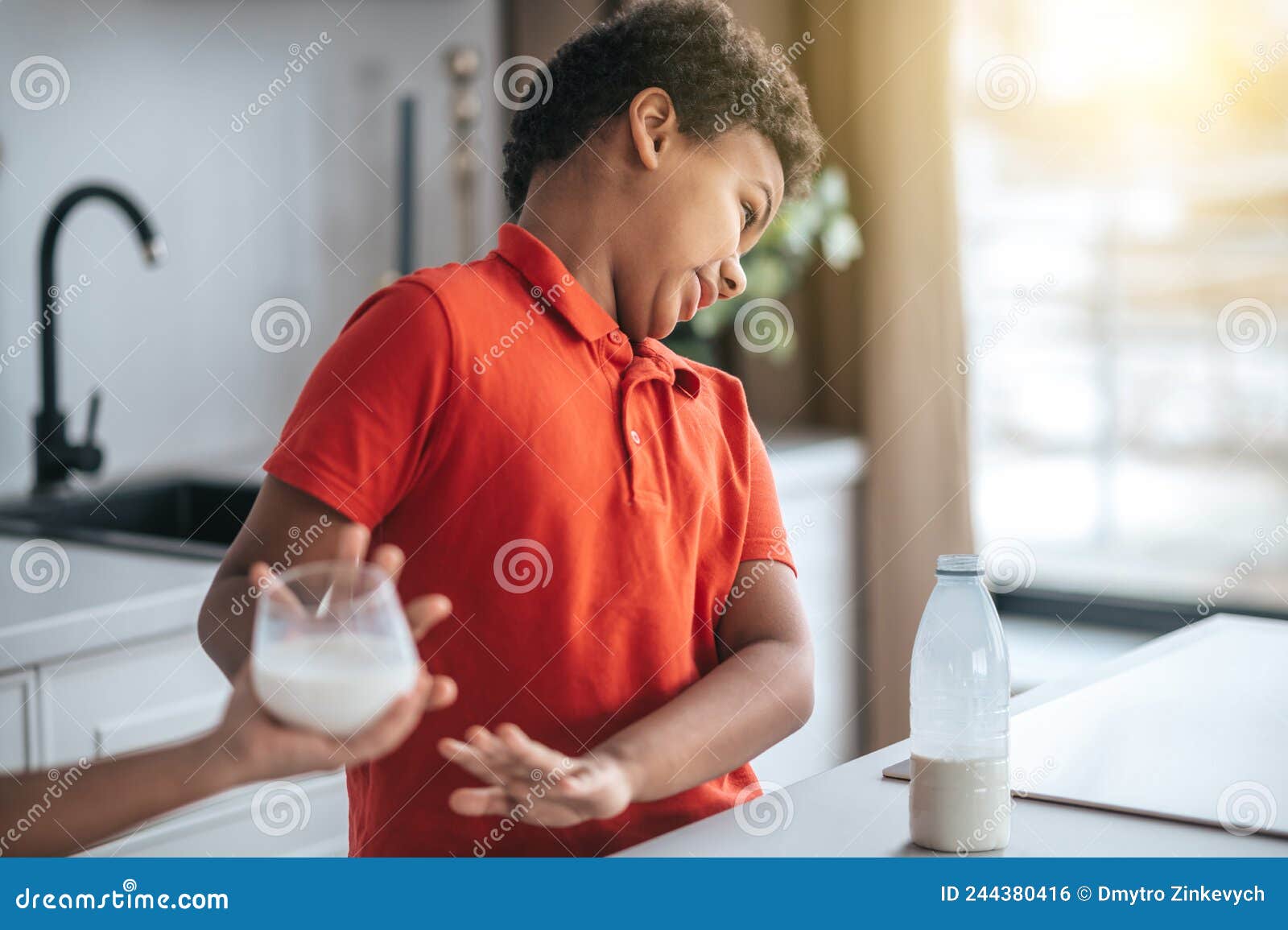 A Boy in Red Shirt Refusing from Milk Stock Photo - Image of kids ...
