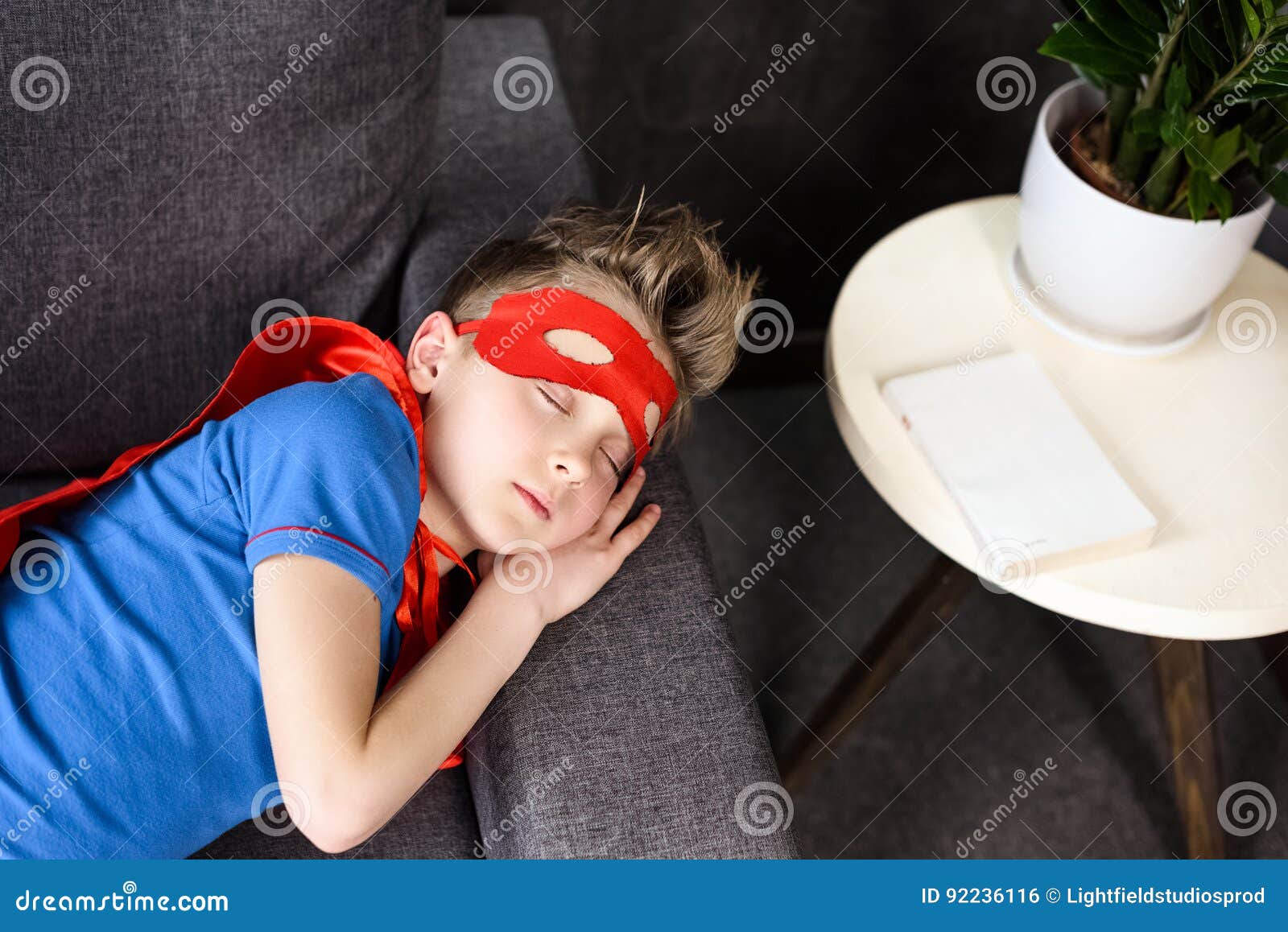 Boy in Red Superhero Costume Sleeping on Sofa Stock Photo - Image of ...