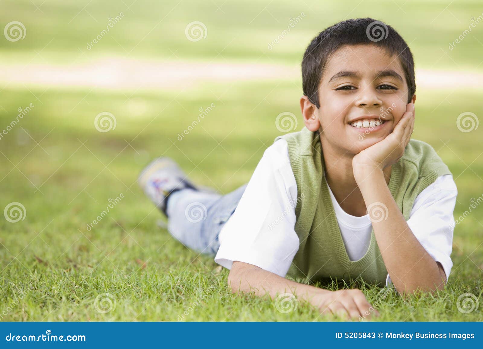 Boy relaxing in park stock image. Image of park, relaxing - 5205843