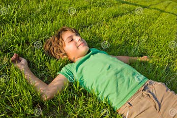 Boy relaxing in summer day stock image. Image of daydreaming - 21195803