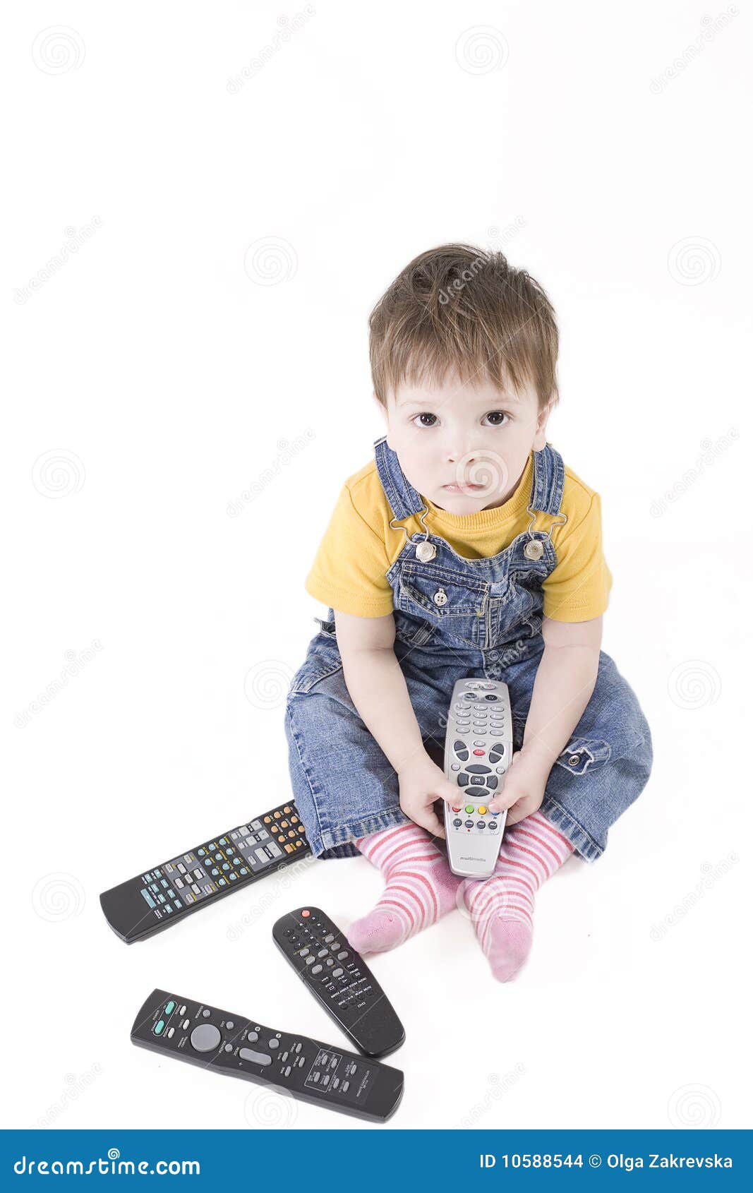 Boy with remote control stock photo. Image of childhood - 10588544