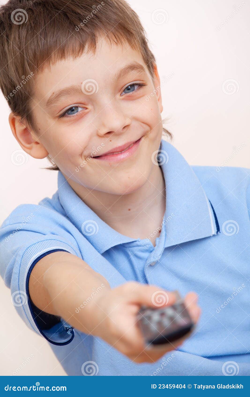 Boy with remote control stock photo. Image of indoors - 23459404