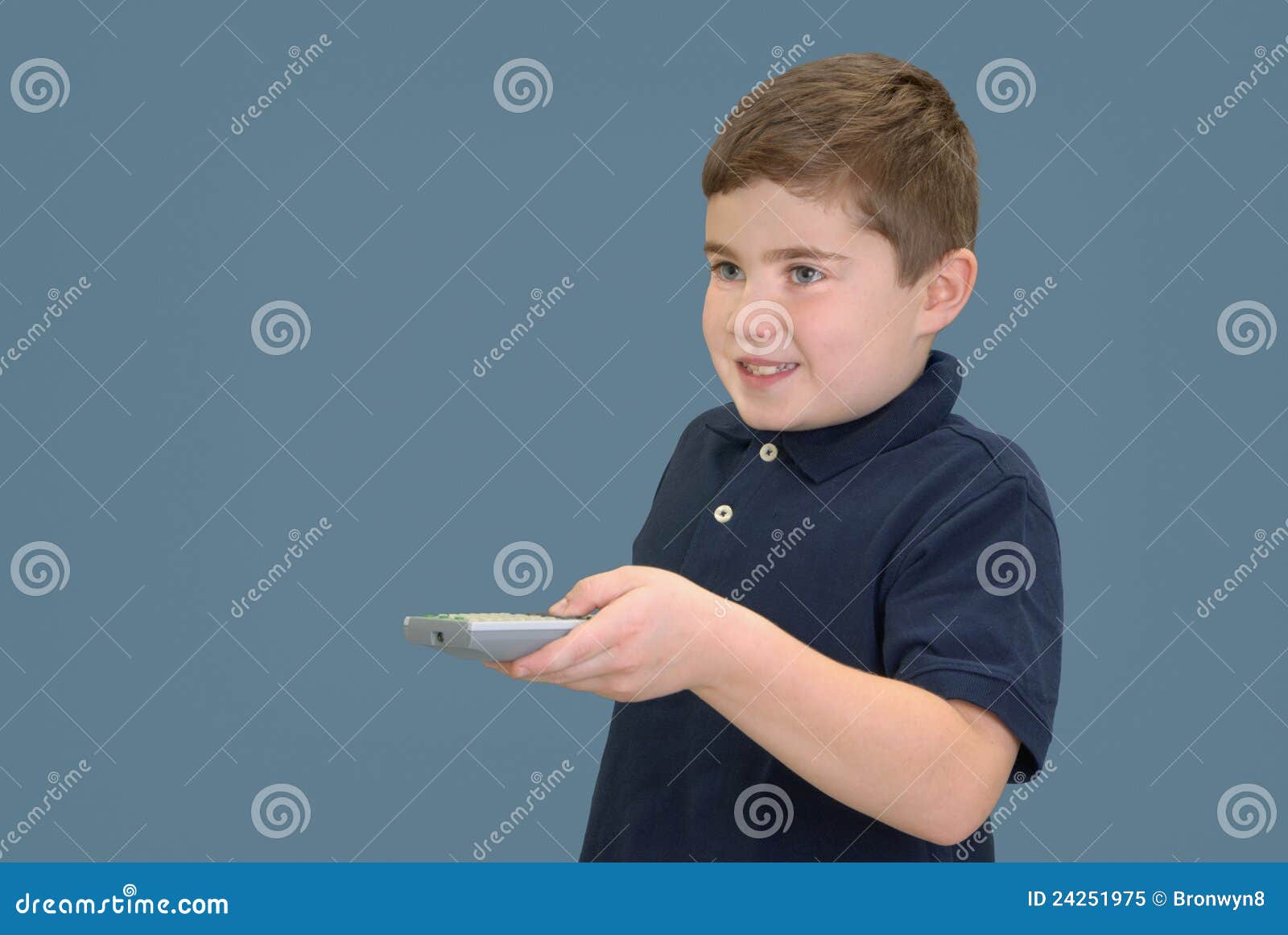 Boy with Remote Control stock image. Image of technology - 24251975