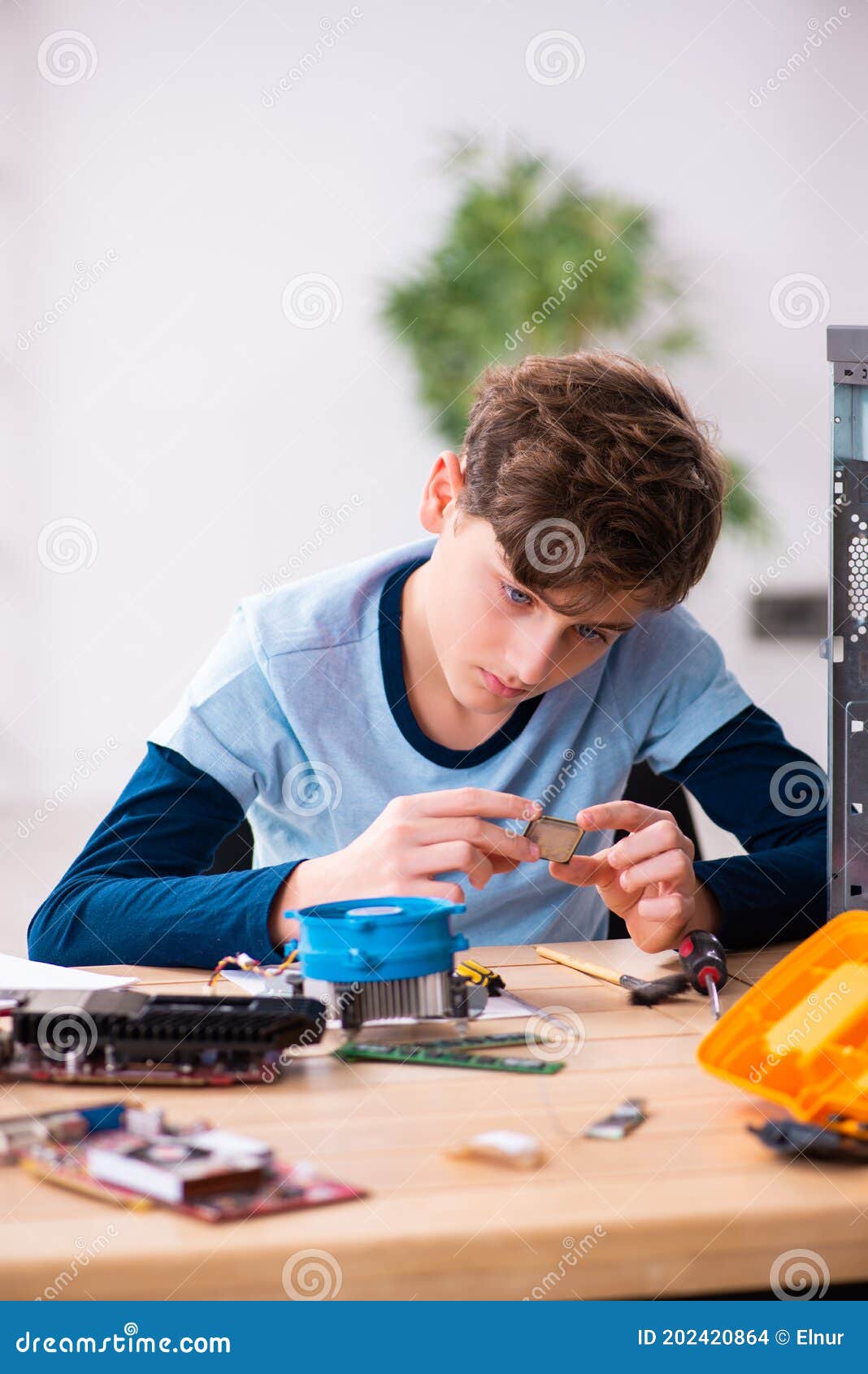 Boy Reparing Computers at Workshop Stock Photo - Image of helpdesk ...