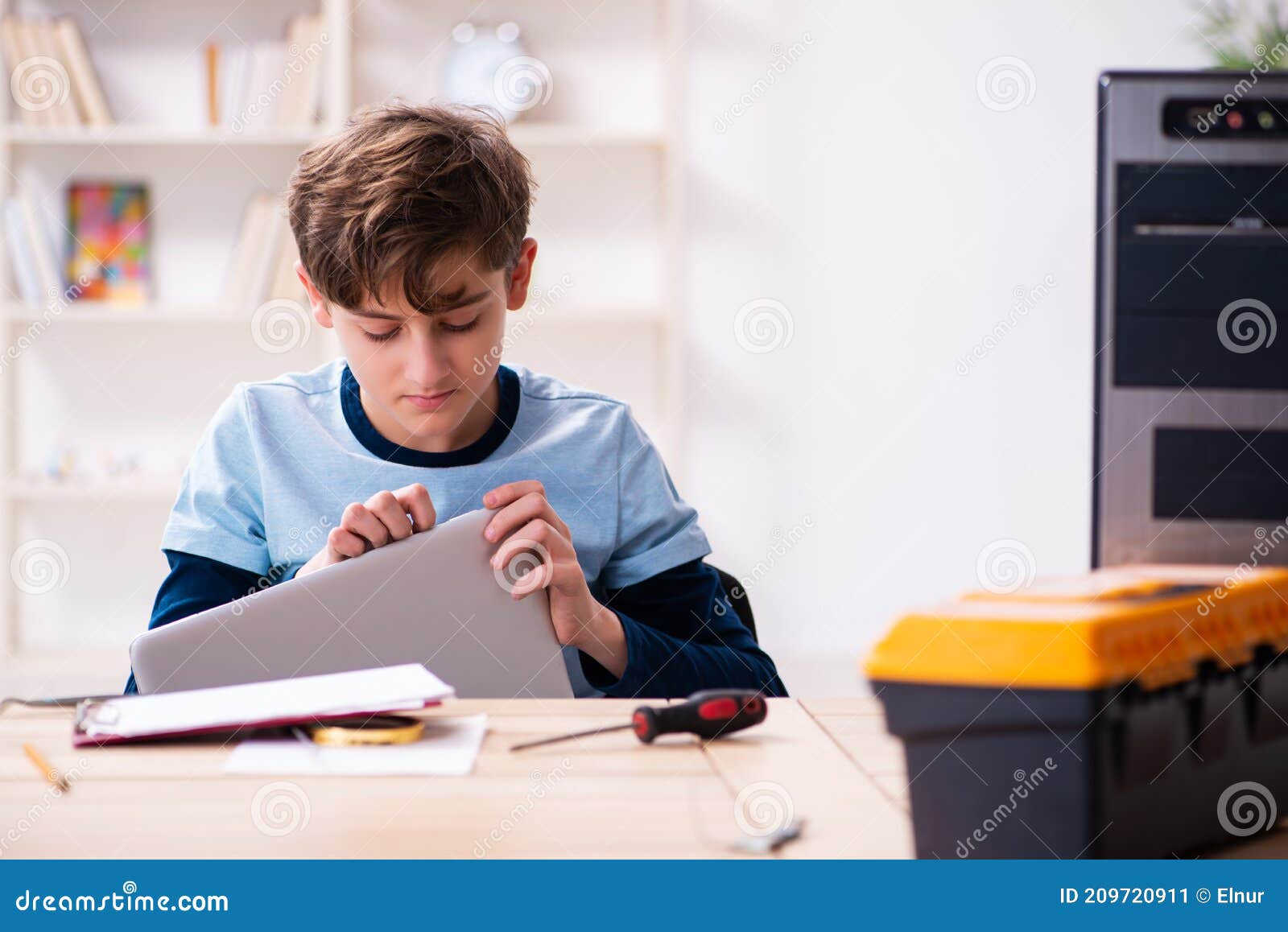 Boy Reparing Computers at Workshop Stock Image - Image of concerned ...