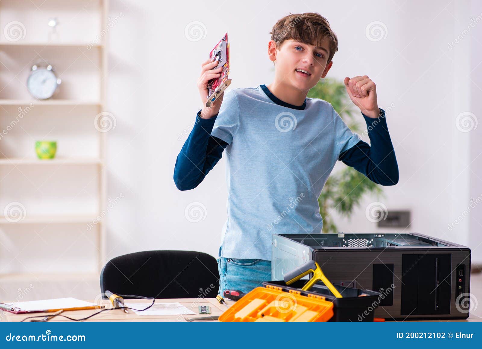 Boy Reparing Computers at Workshop Stock Photo - Image of processor ...