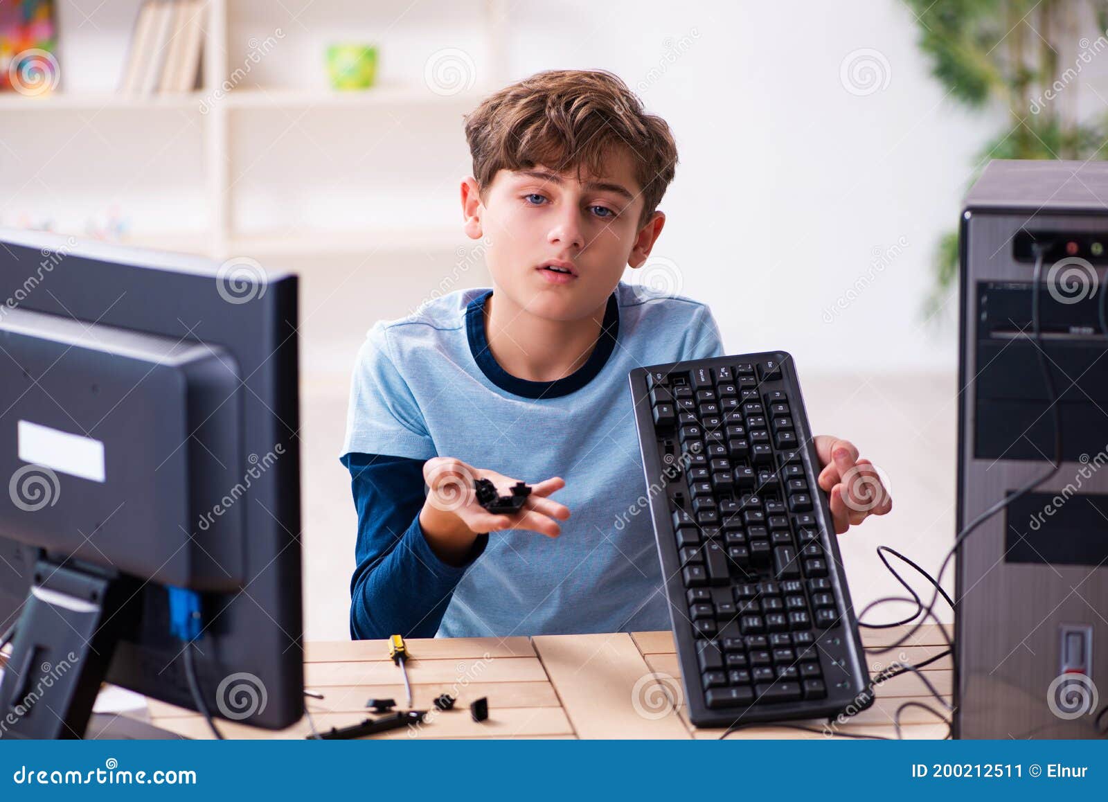 Boy Reparing Computers at Workshop Stock Image - Image of center ...