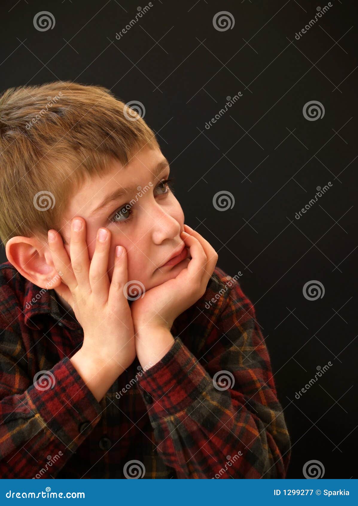 Boy resting face in hands stock image. Image of youngster - 1299277