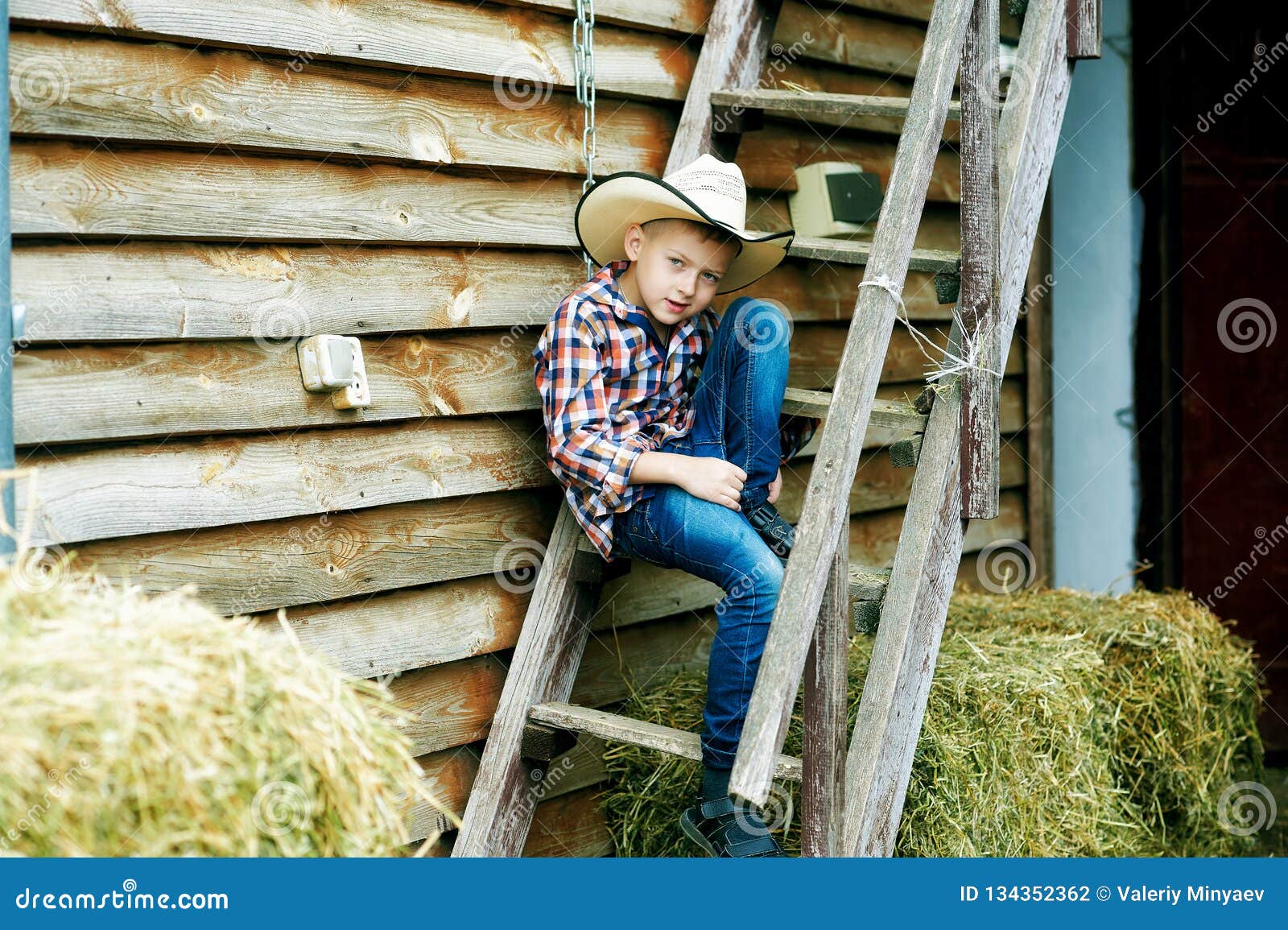 Boy Resting in the Summer on the Ranch Stock Photo - Image of summer ...